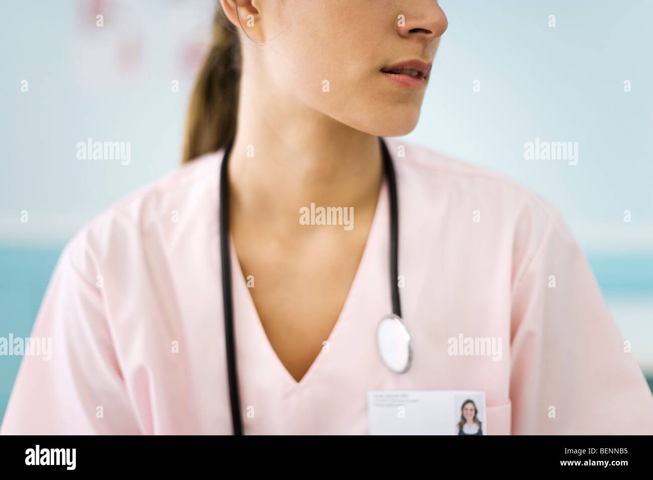 Nurse turning head, cropped Stock Photo - Alamy