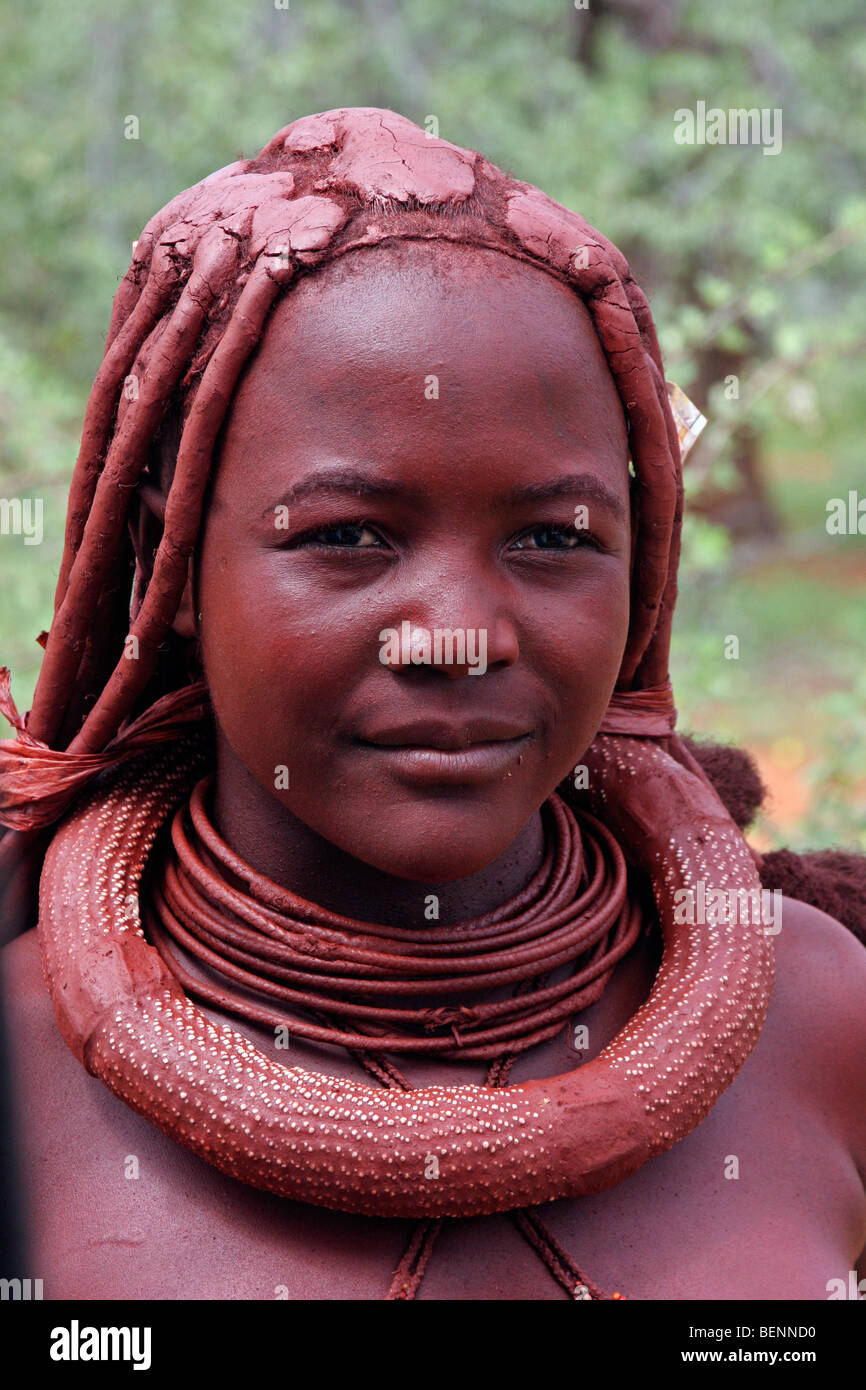 Himba woman covered in Otjize, a mixture of butter fat and ochre ...