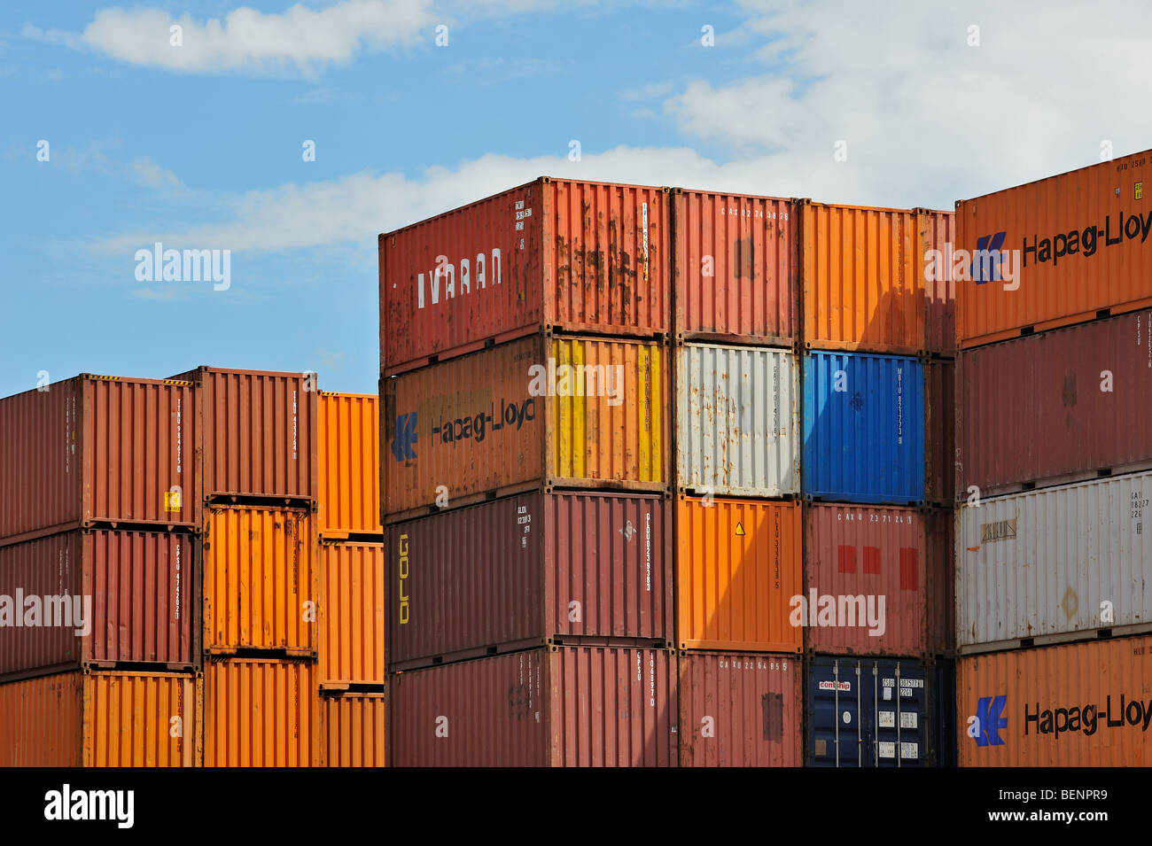 Piled up / Stacked up shipping containers at container terminal in port ...