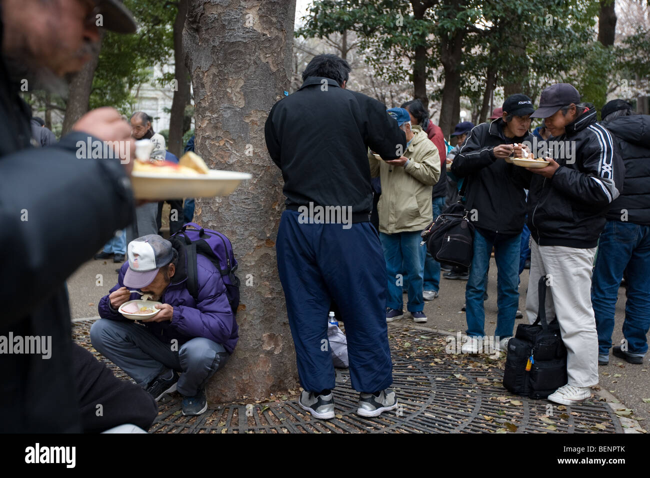Approximately 700 homeless men attend a soup kitchen run by a Korean ...