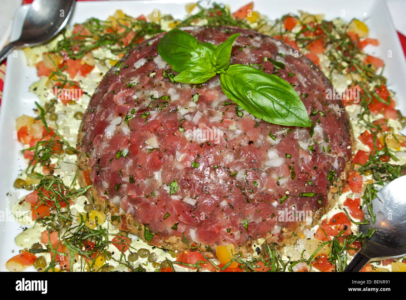 Fatty Omega 3 rich raw Kona Kampachi fish tartare with capers diced red ...
