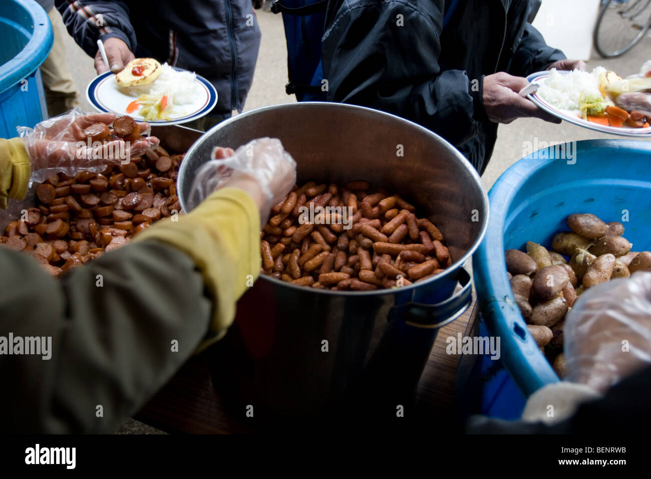 Approximately 700 homeless men attend a soup kitchen run by a Korean ...