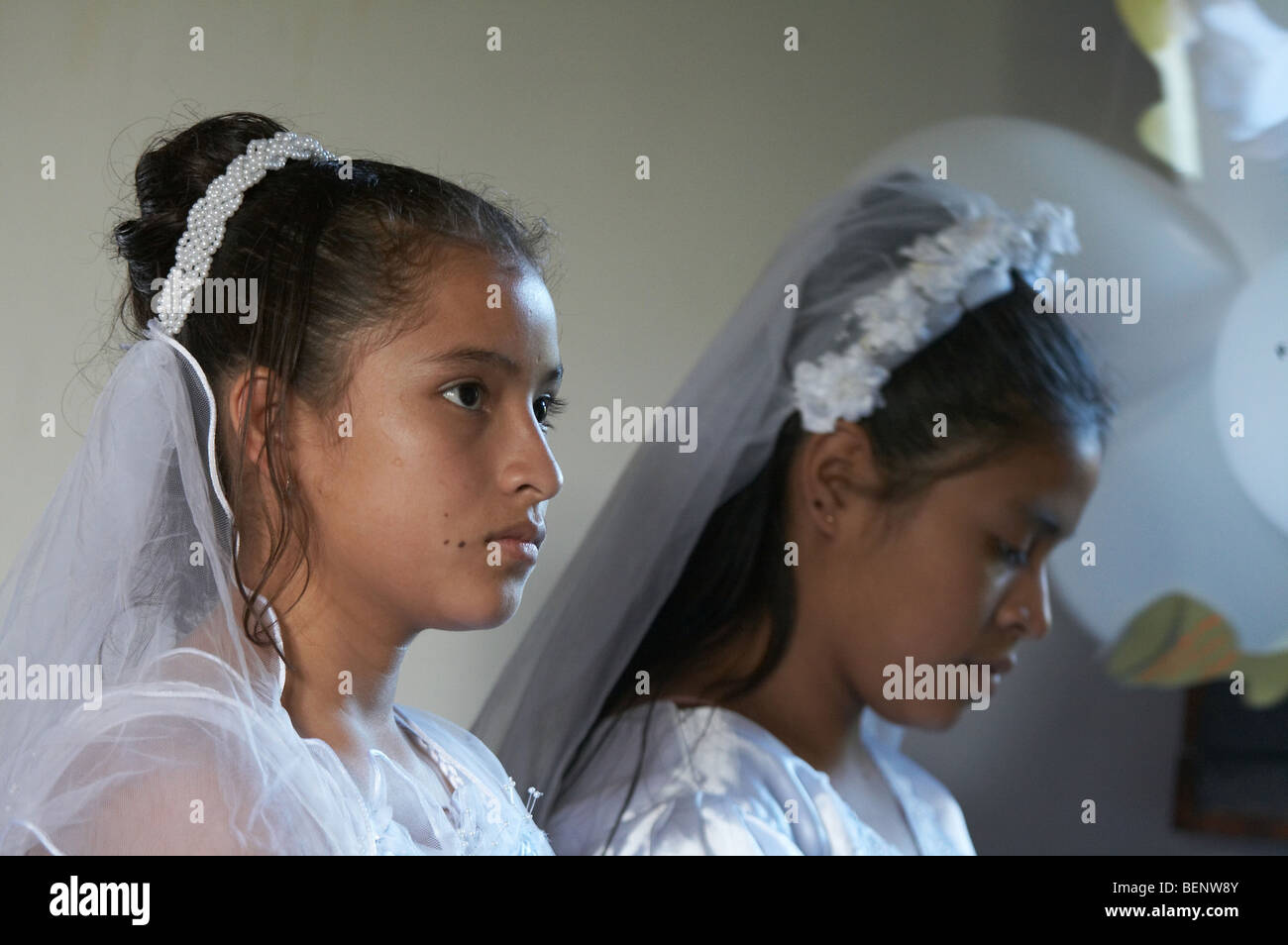 GUATEMALA Catholic First Communion and mass at Remate, El Peten. Girls ...