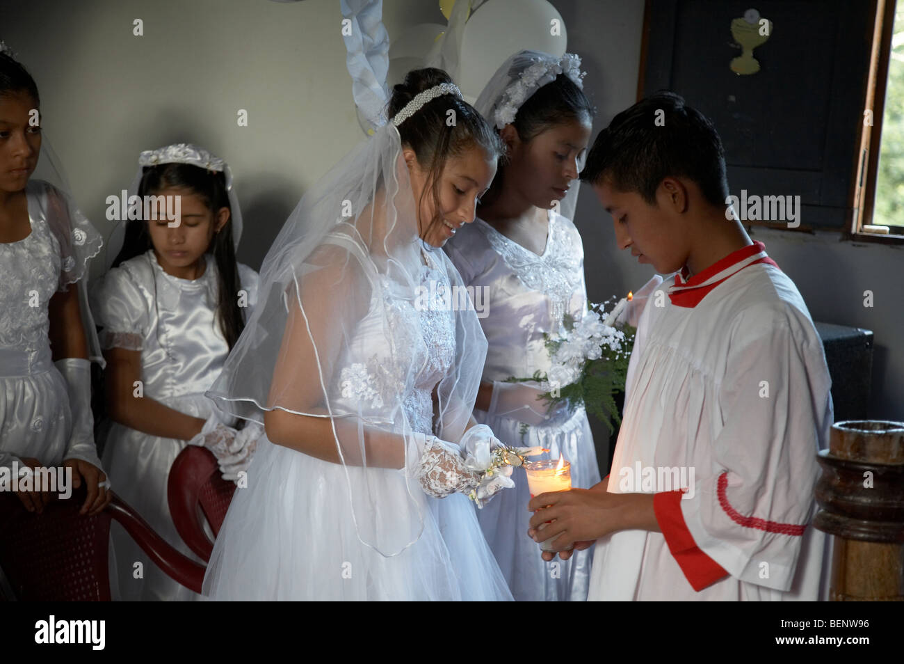 GUATEMALA Catholic First Communion and mass at Remate, El Peten. Girls ...