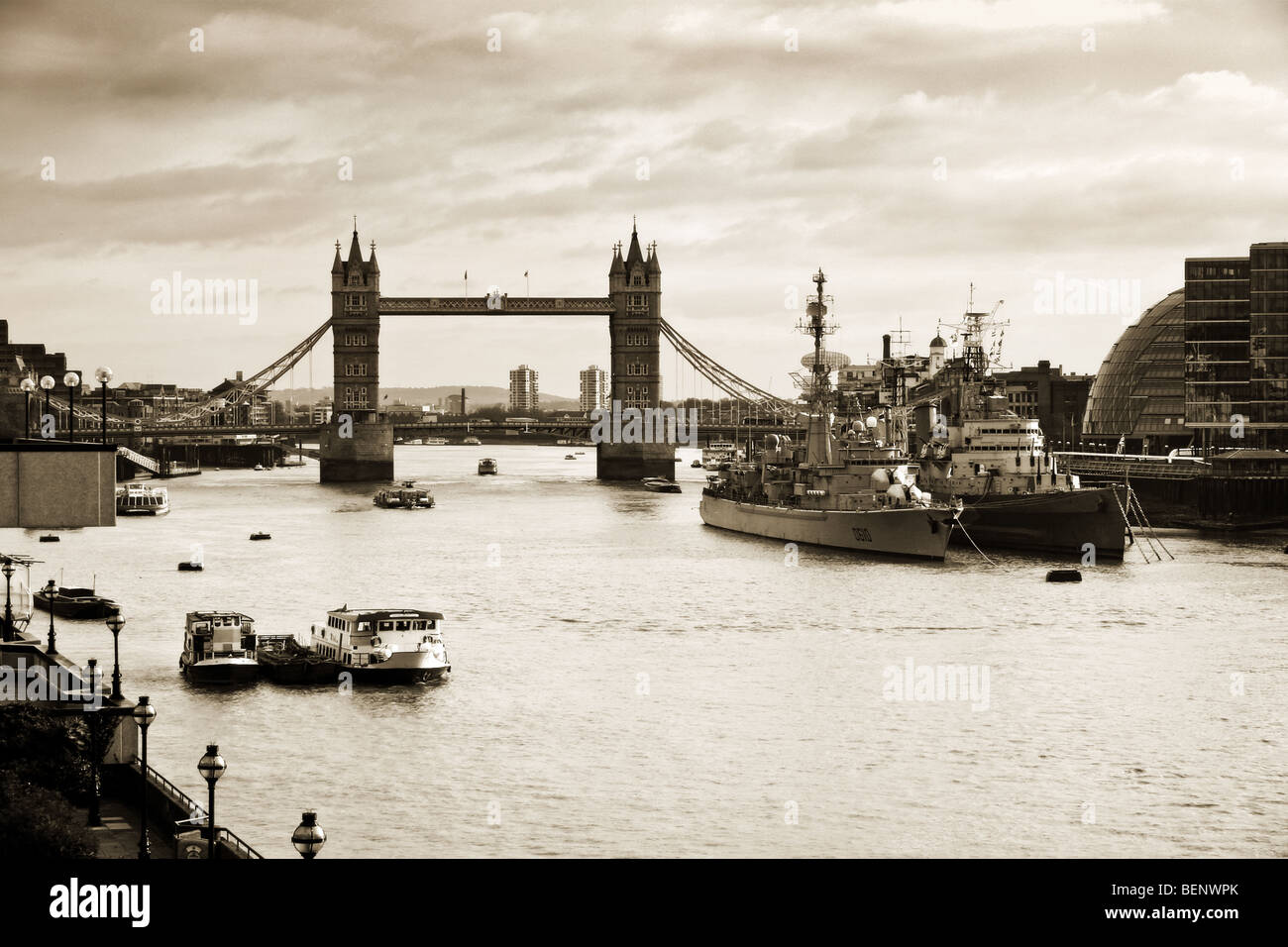 View of Tower Bridge and the pool of London with two warships Stock ...