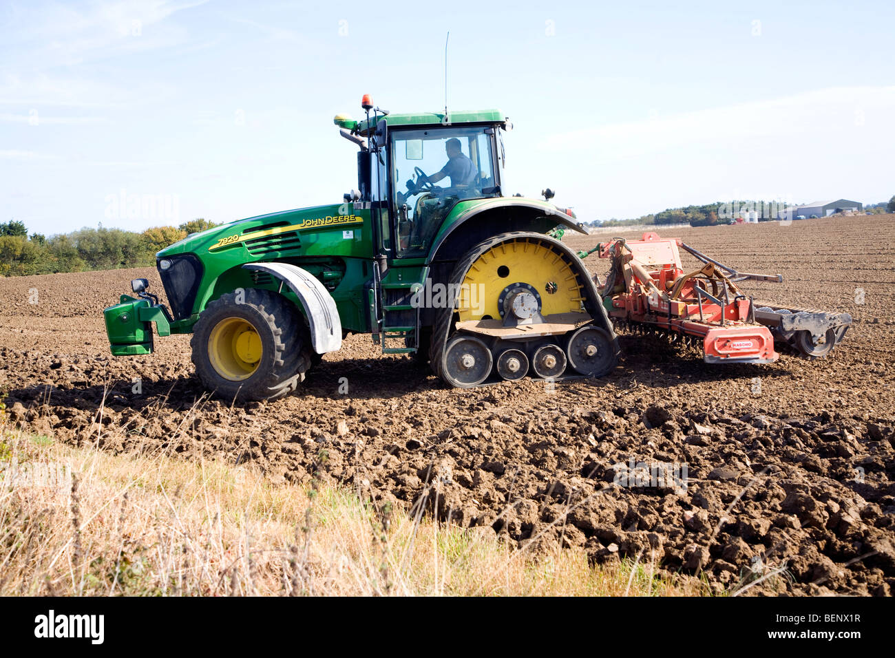 Tractor harrowing field, Parham, Suffolk, England Stock Photo - Alamy