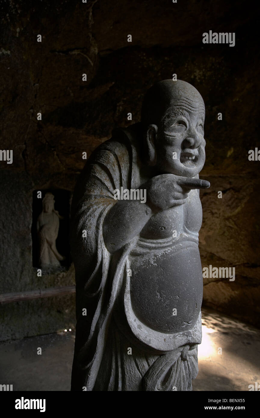 JAPAN Jochi-ji Zen temple, Kamakura. Statue of laughing Buddha. photo ...