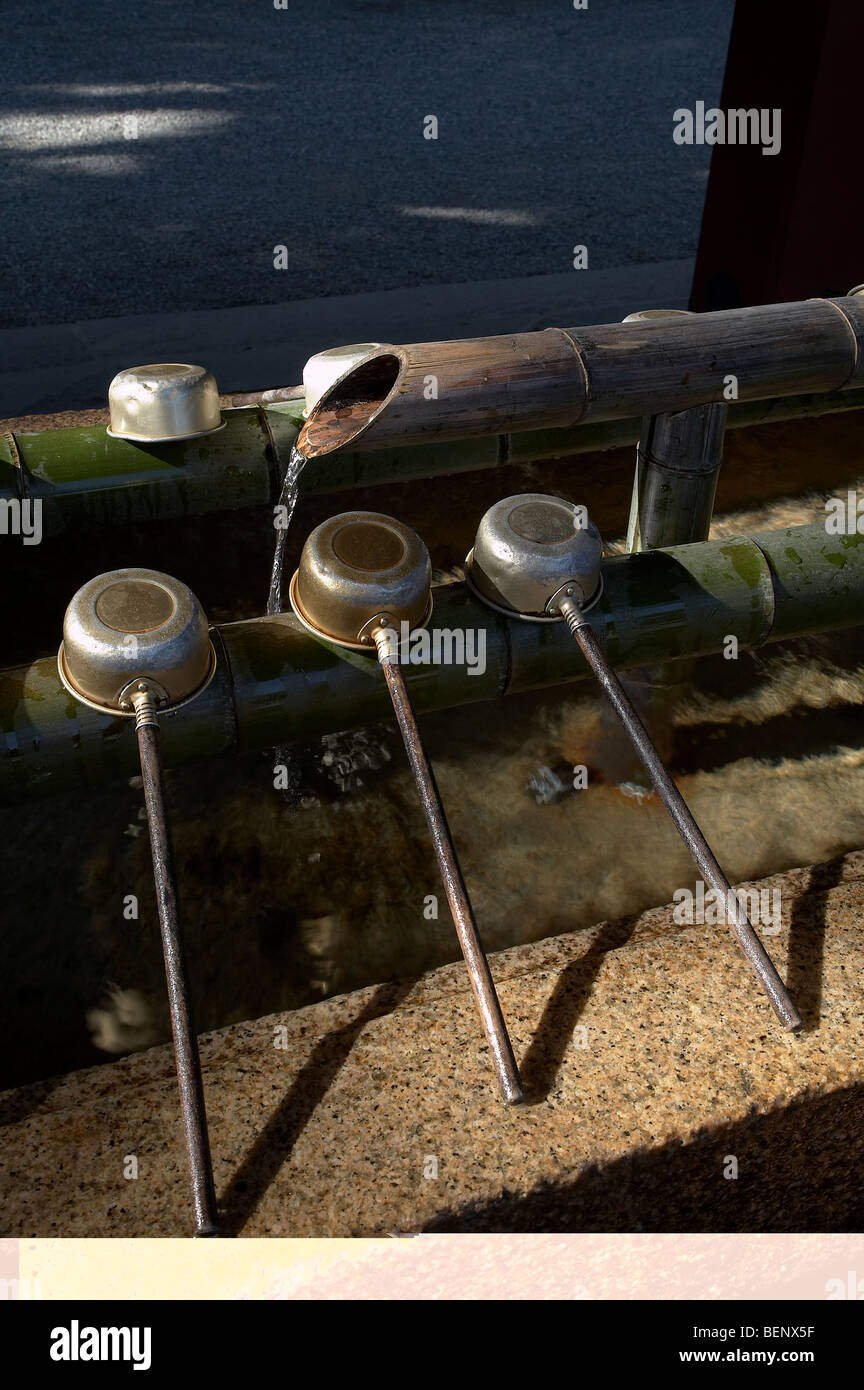 JAPAN Tsurugaoka Hachiman-gu shrine, Kamakura. Cups for drinking water ...
