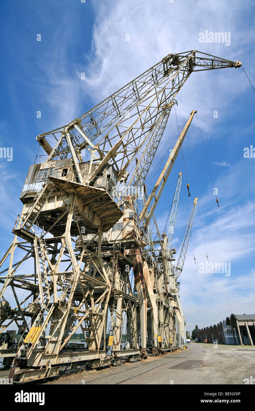Historic dock cranes at the shipping trade museum along the docks in ...