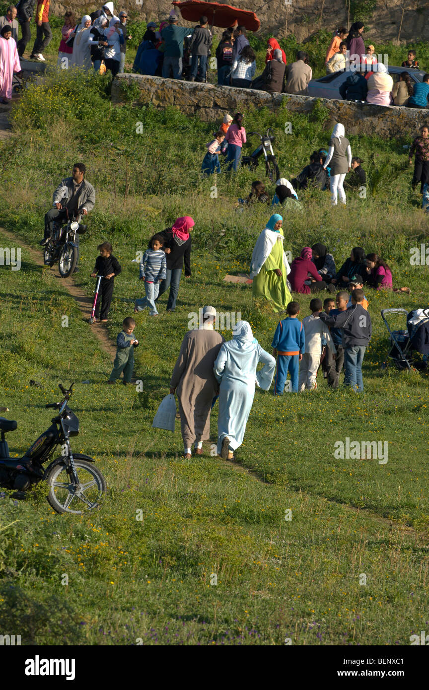 Muslims visit the Chella Necropolis on a Friday, Rabat, Morocco, Africa ...