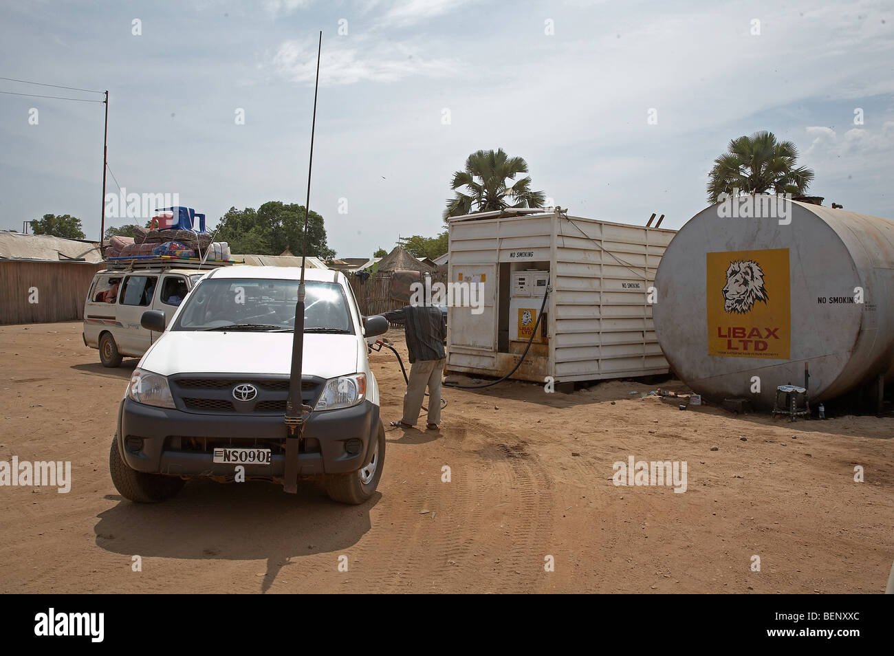 SOUTH SUDAN Filling cars at a petrol station in Juba. PHOTO by SEAN ...