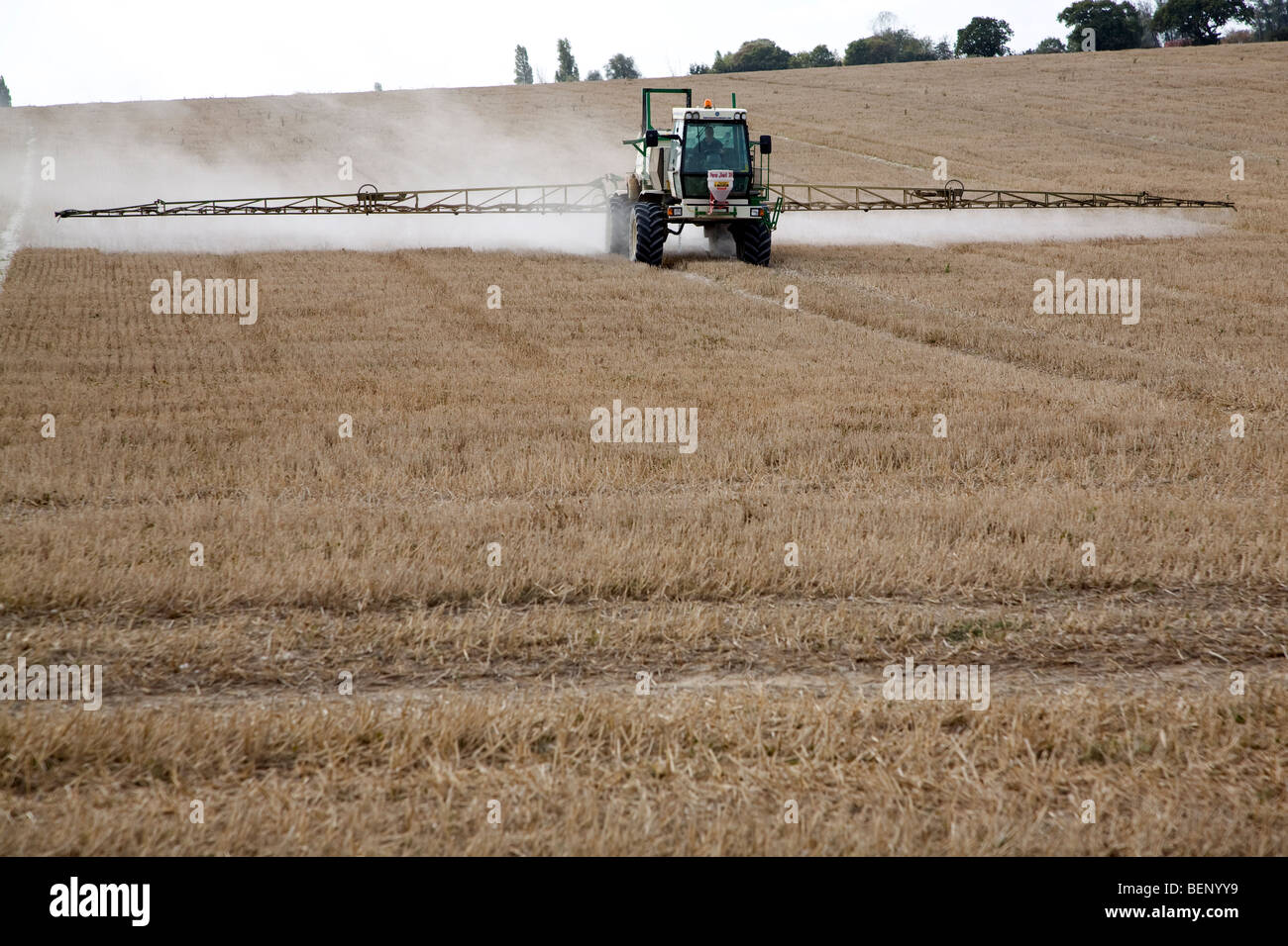Chemical sprayer spraying field Stock Photo - Alamy