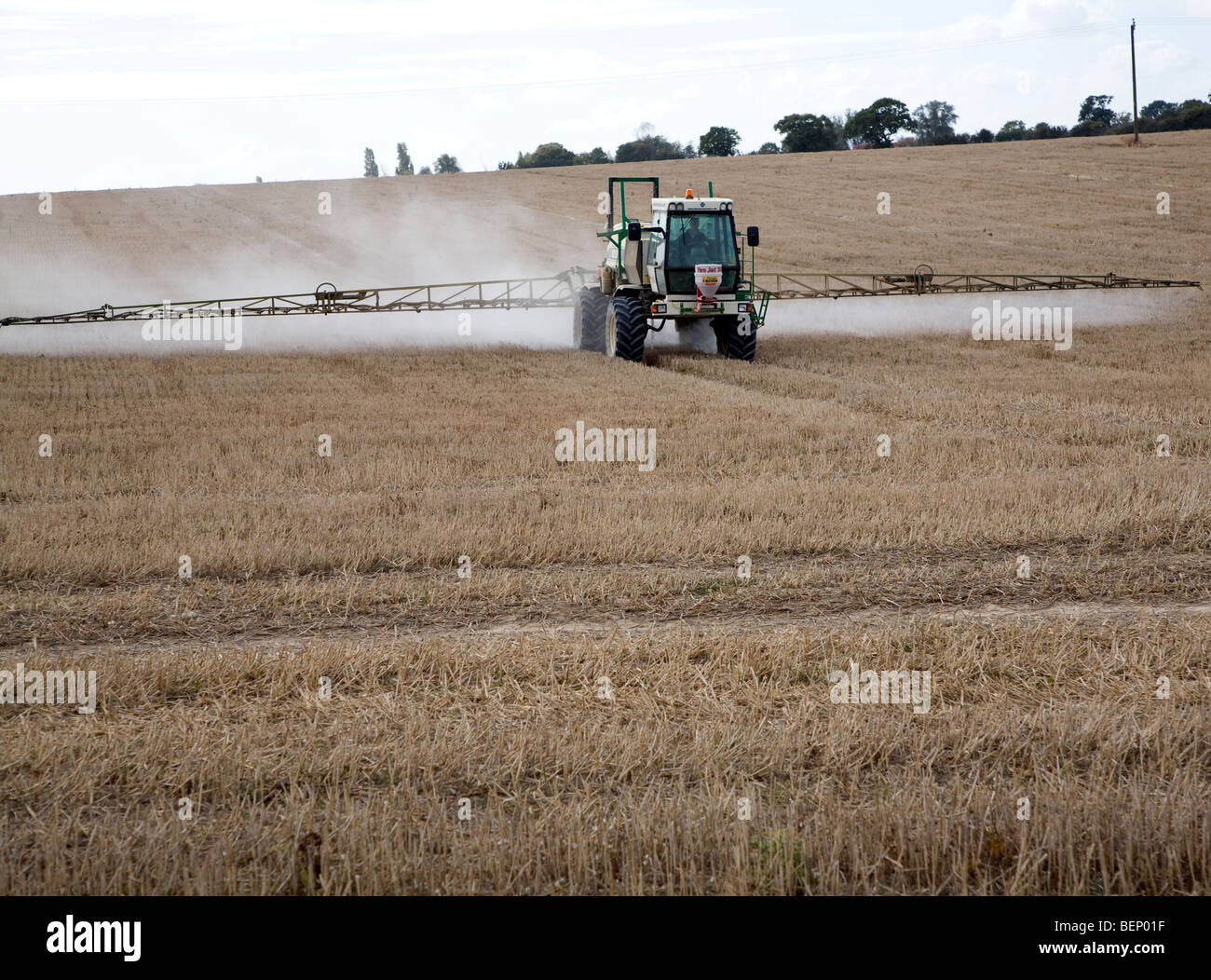 Chemical sprayer spraying field Stock Photo - Alamy