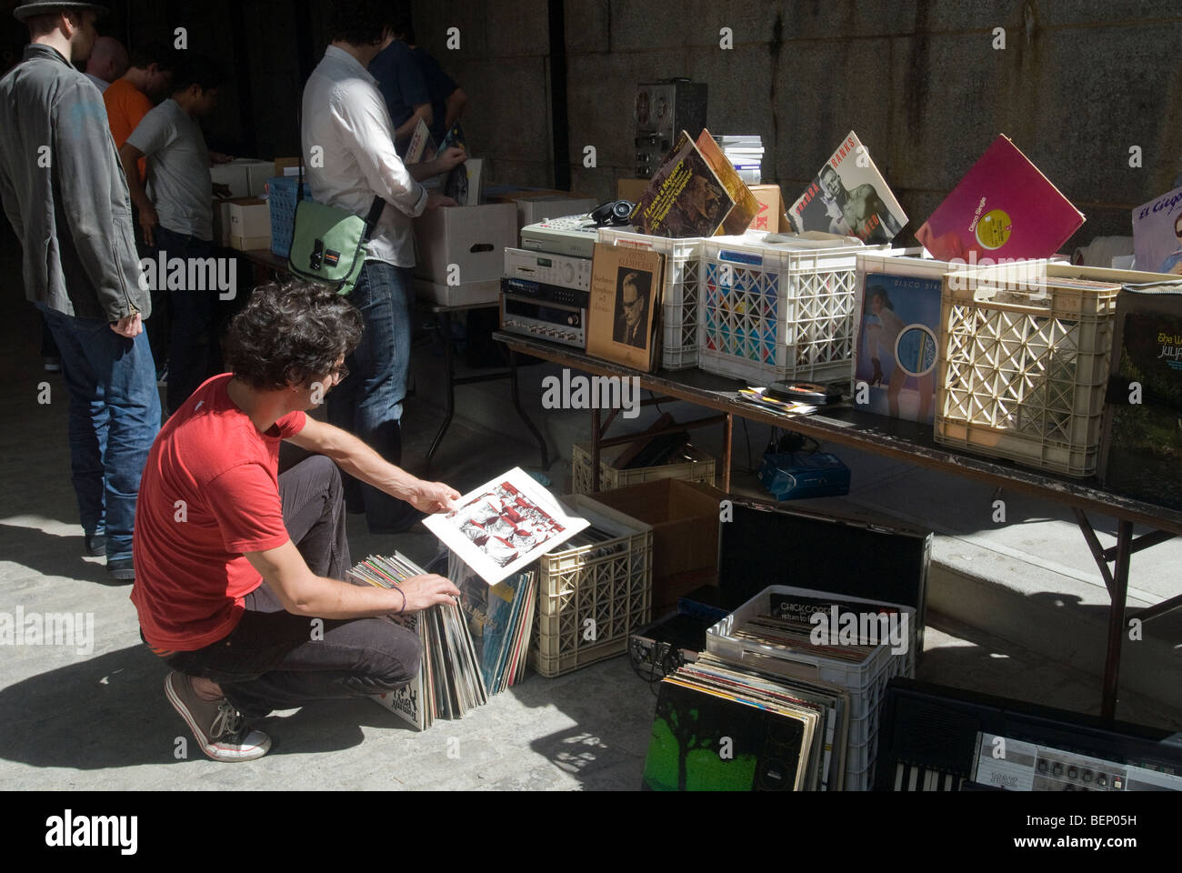 Music lovers sort through stacks and stacks of vinyl records at the DJ ...