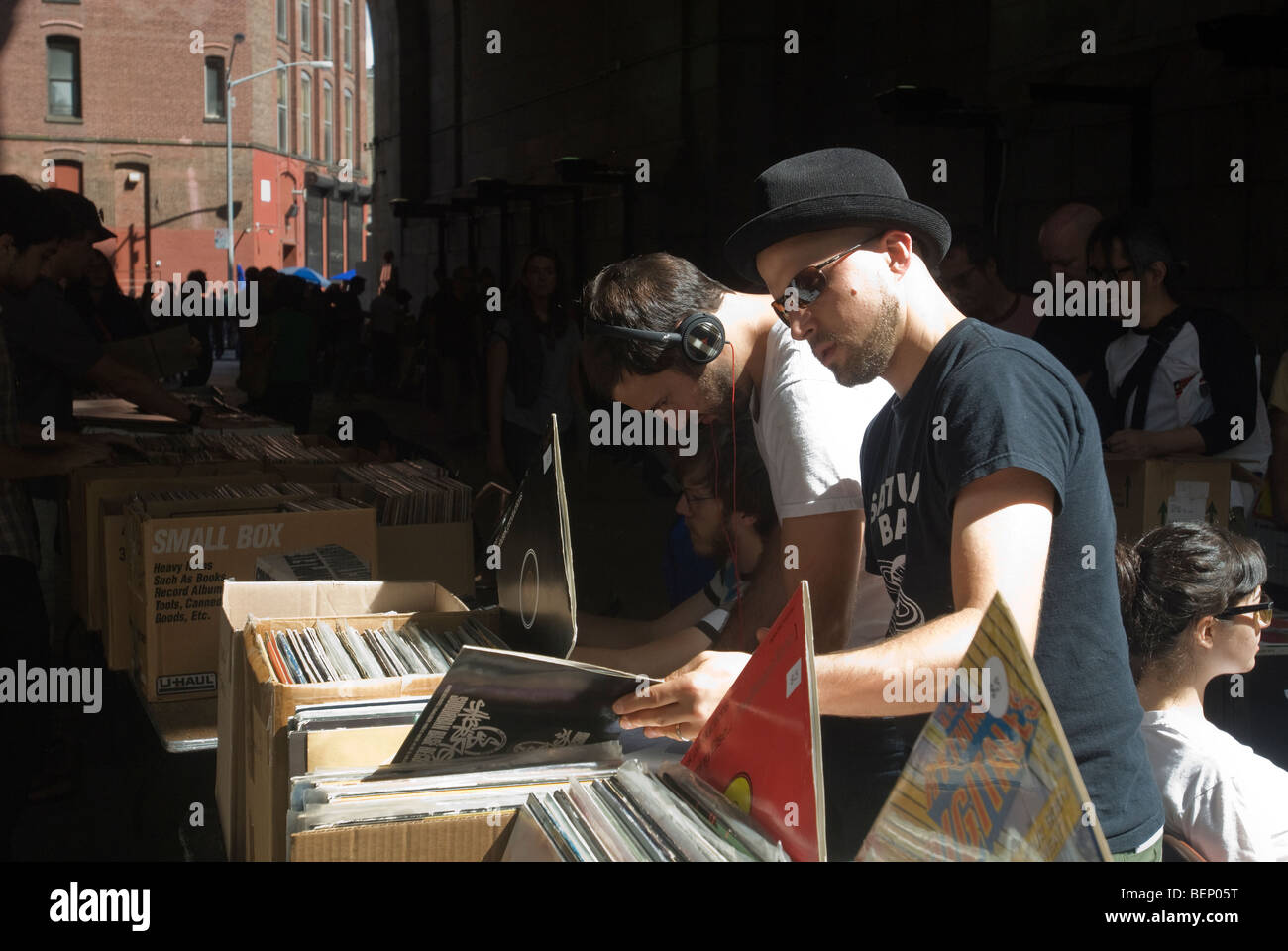 Music lovers sort through stacks and stacks of vinyl records at the DJ ...