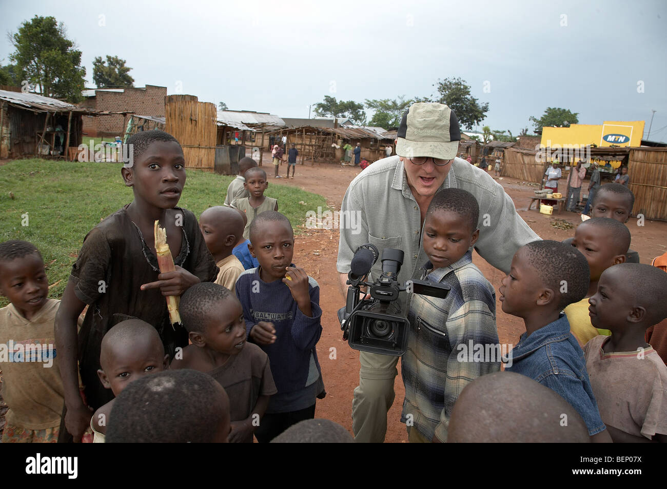UGANDA Tony Wilson filiming, Village of Kayunga District PHOTO by SEAN ...