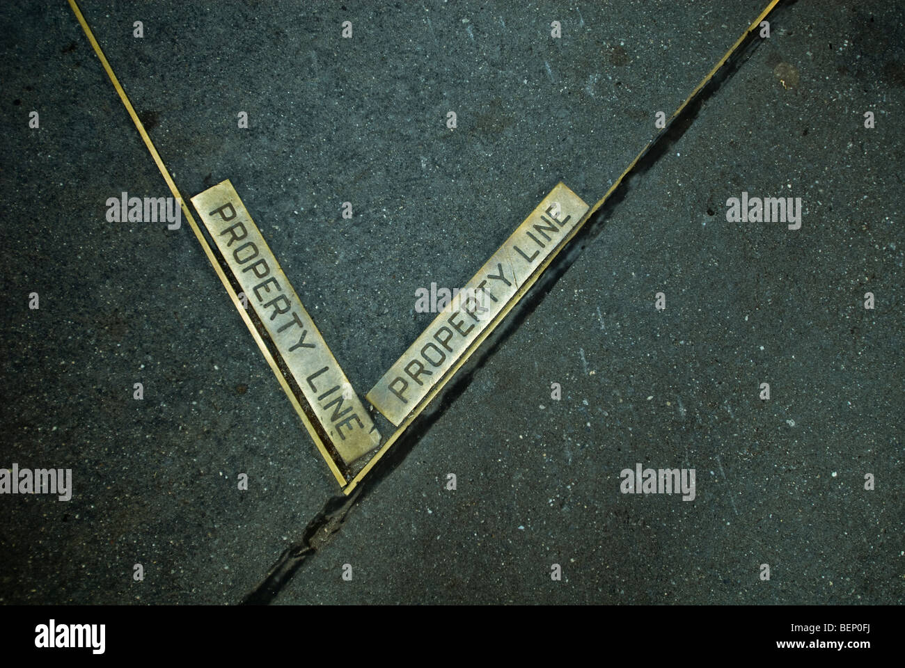 Sign delineating the end of property for an office building in New York ...