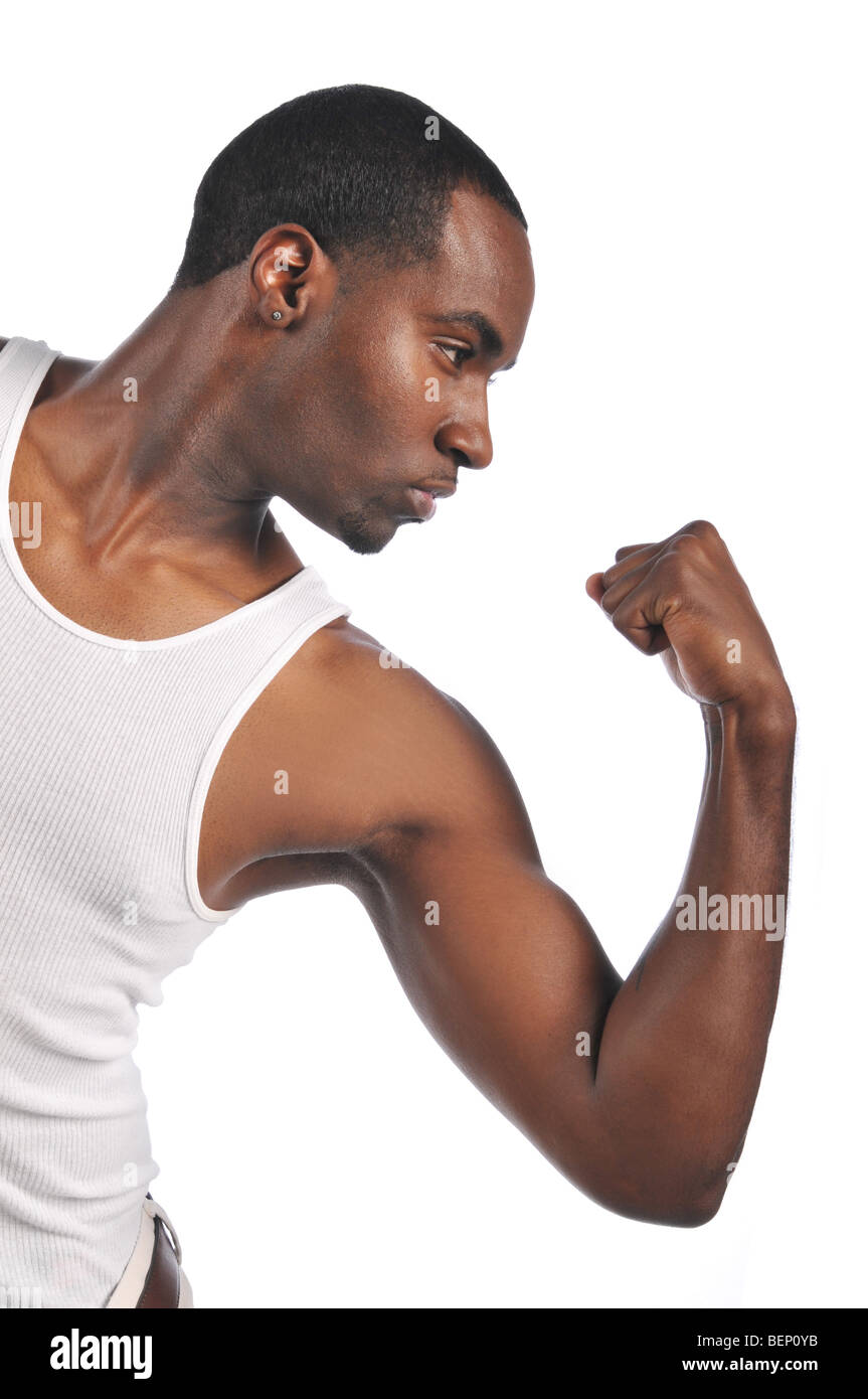 African american young man showing biceps isolated on white Stock Photo ...