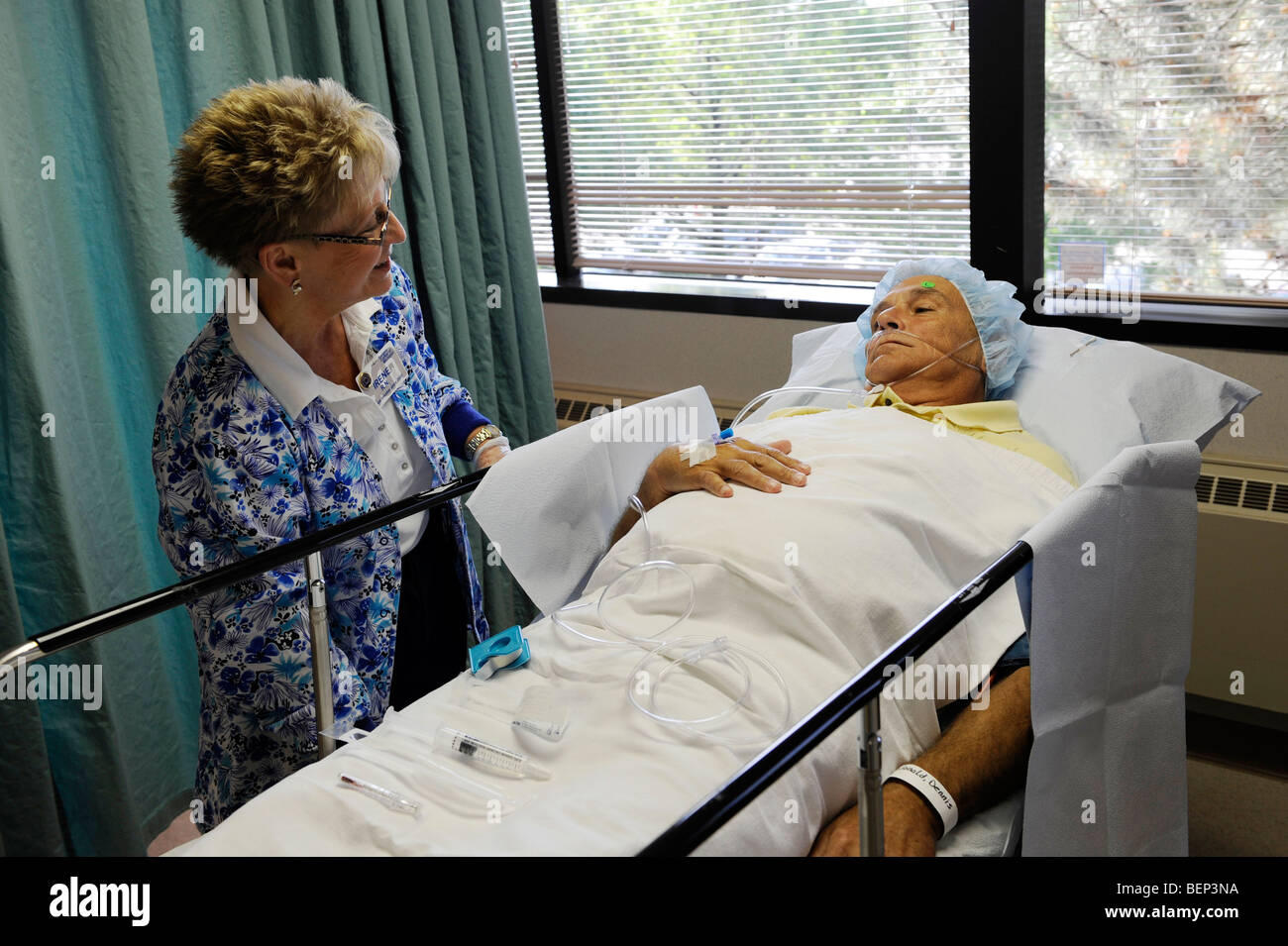 Adult male is prepare and undergoes a crystalens eye implant for ...