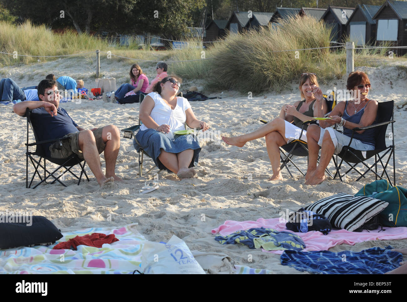Tourists laying in sun on beach hi-res stock photography and images - Alamy