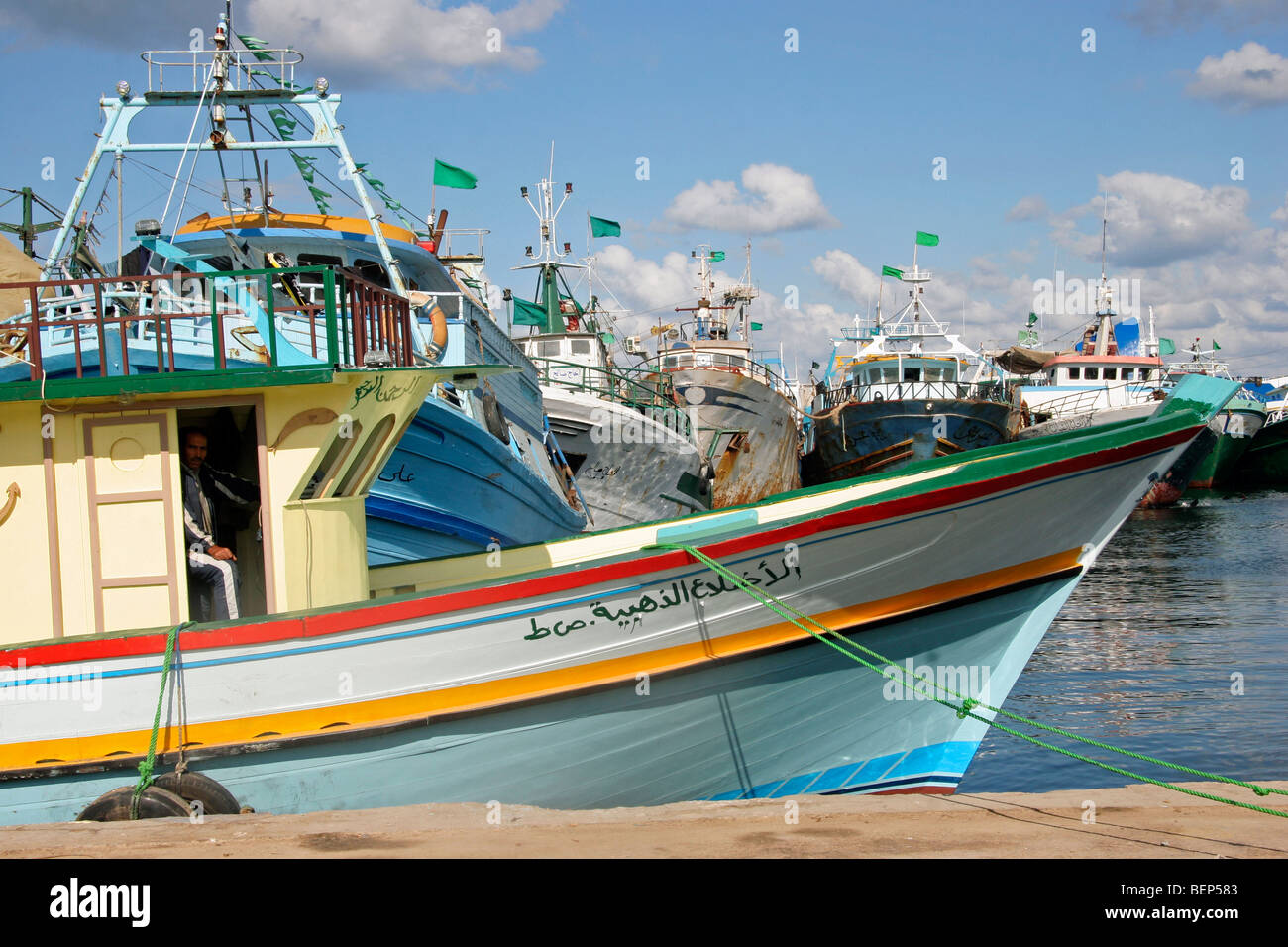 Colourful fishing boats in the harbour of Tripoli, Libya, North Africa ...