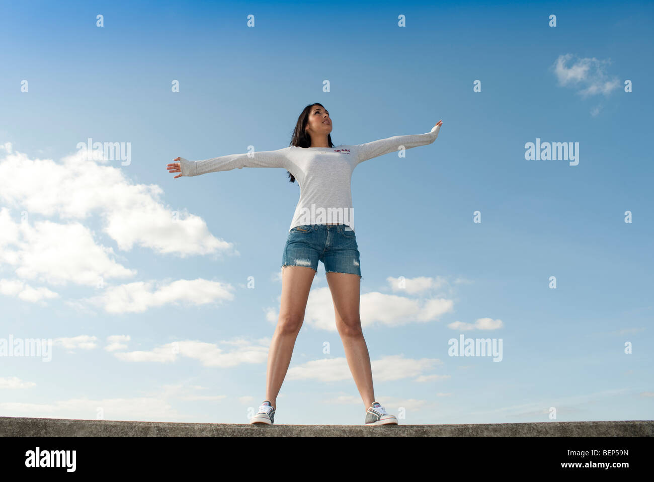 woman stretching arms out Stock Photo - Alamy