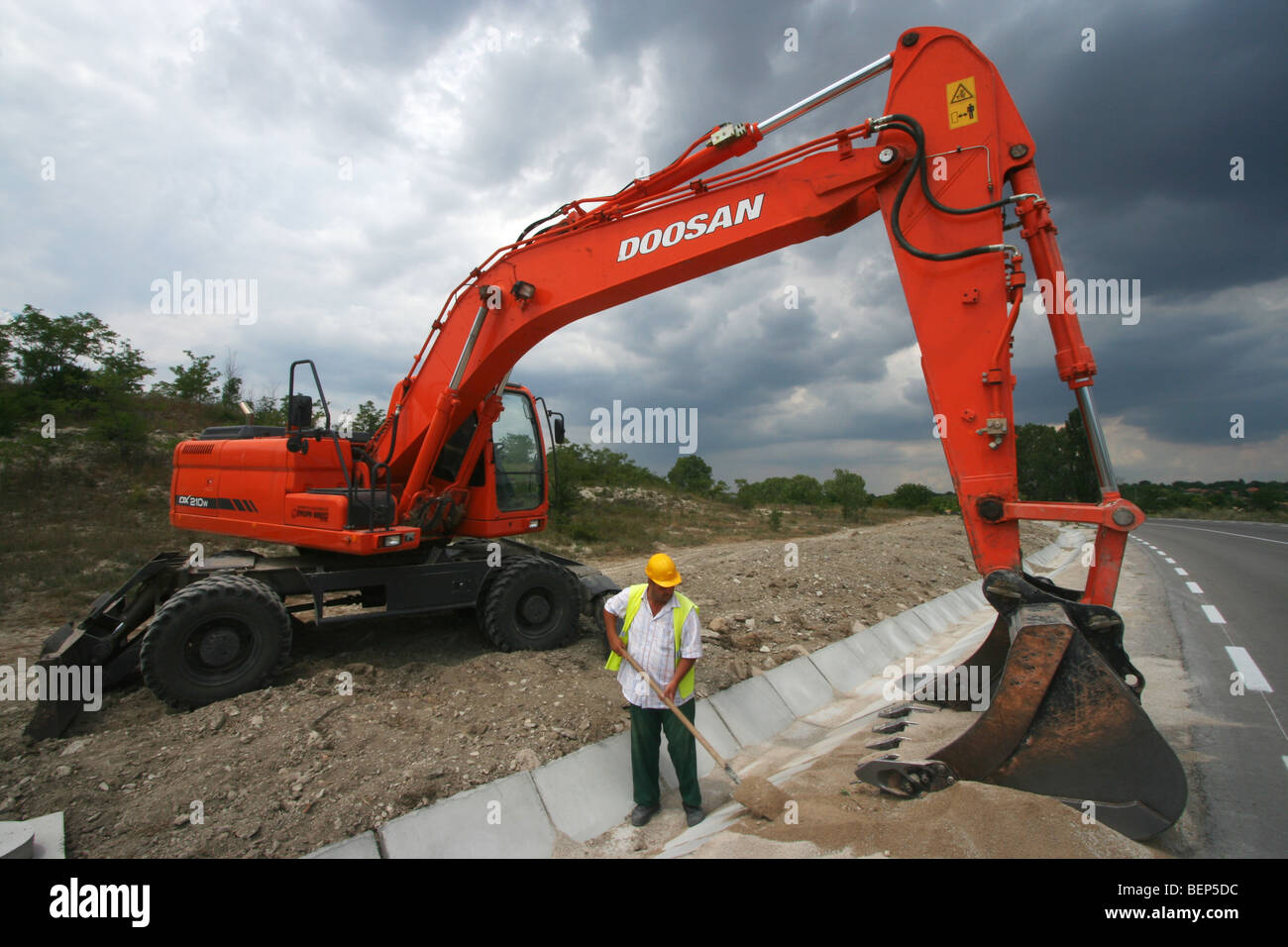 Red excavator hi-res stock photography and images - Alamy
