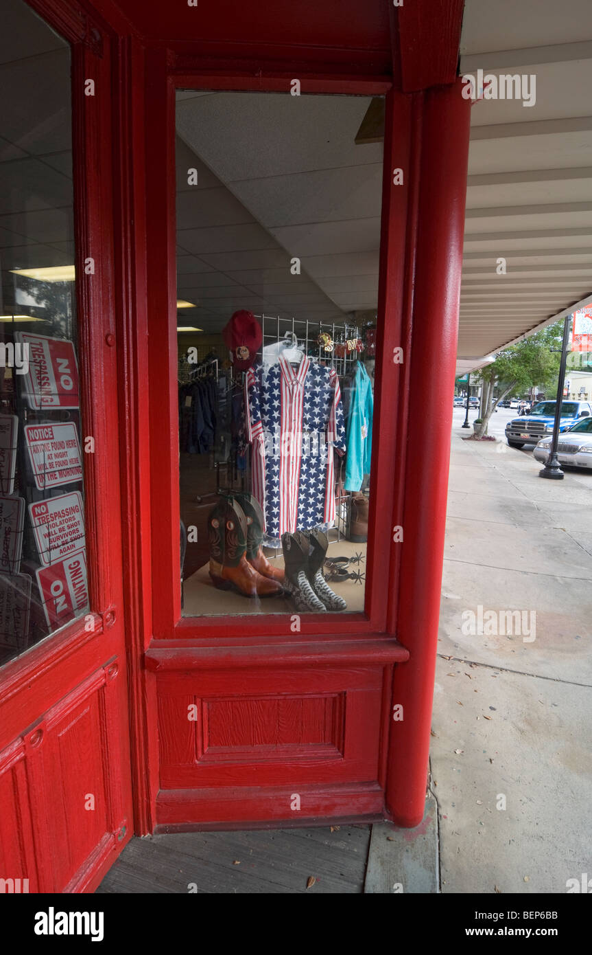 storefront small town retail window western wear Stock Photo - Alamy