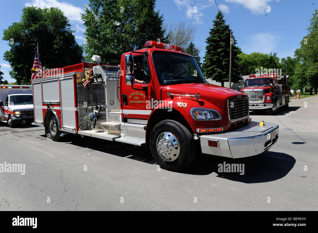 Red firetruck in patriotic parade Stock Photo - Alamy