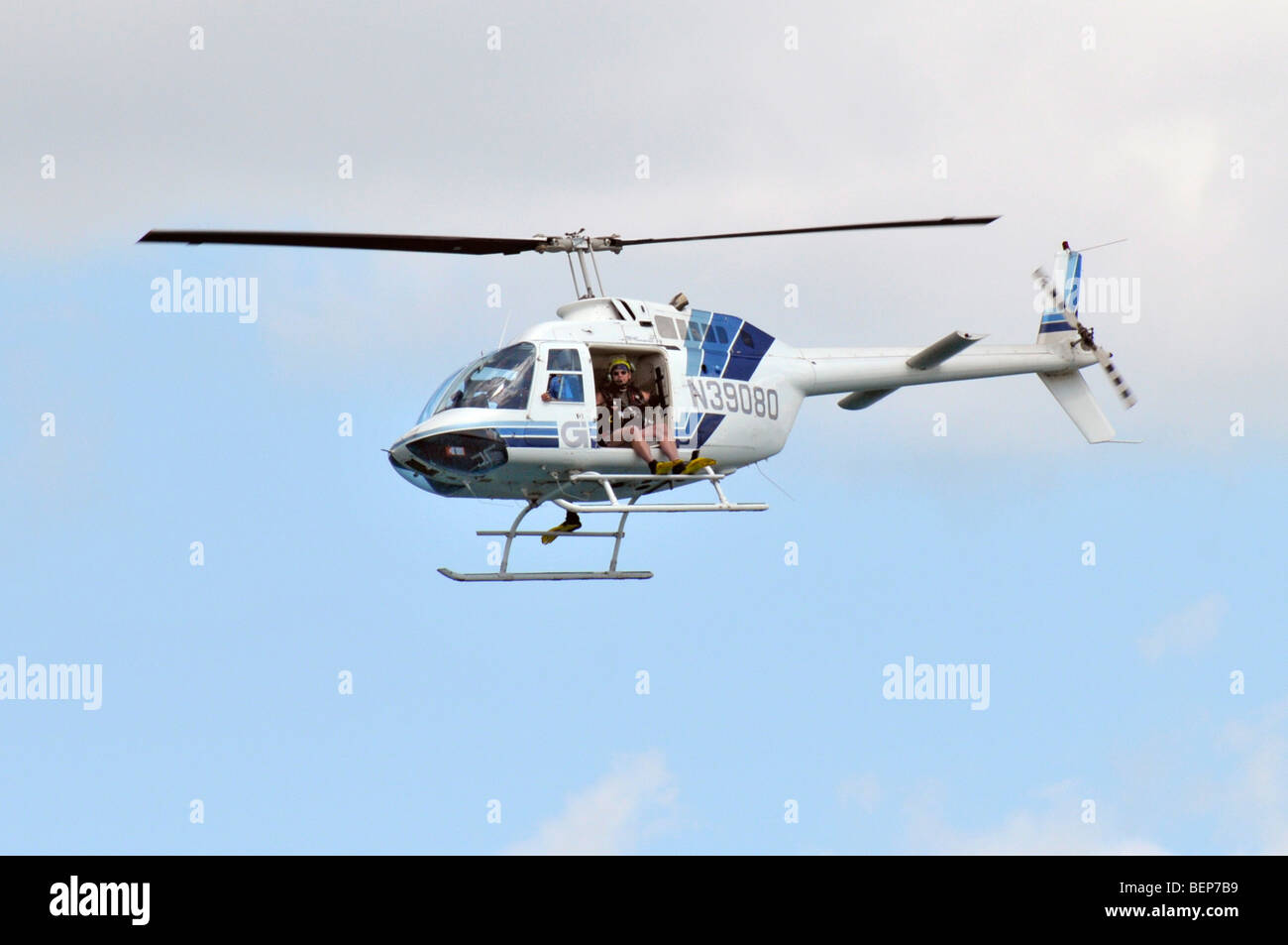 helicopter hovers over water Stock Photo - Alamy