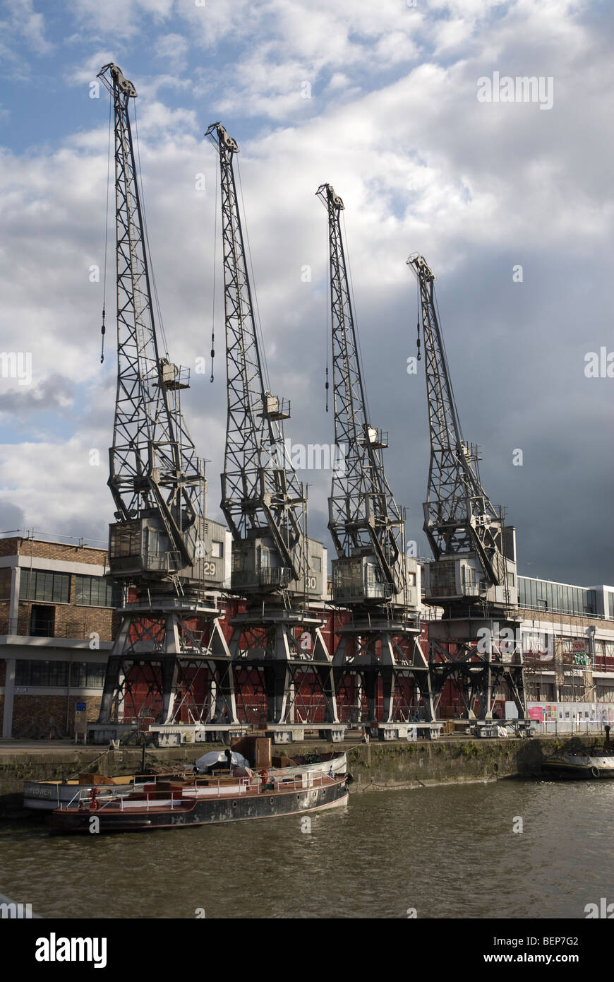 Four cranes on the dockside at Bristol Docks, UK Stock Photo - Alamy