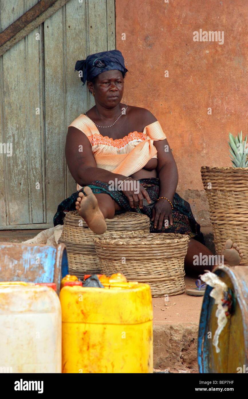 Black woman selling goods at market in Tsévié, Togo, West Africa Stock ...