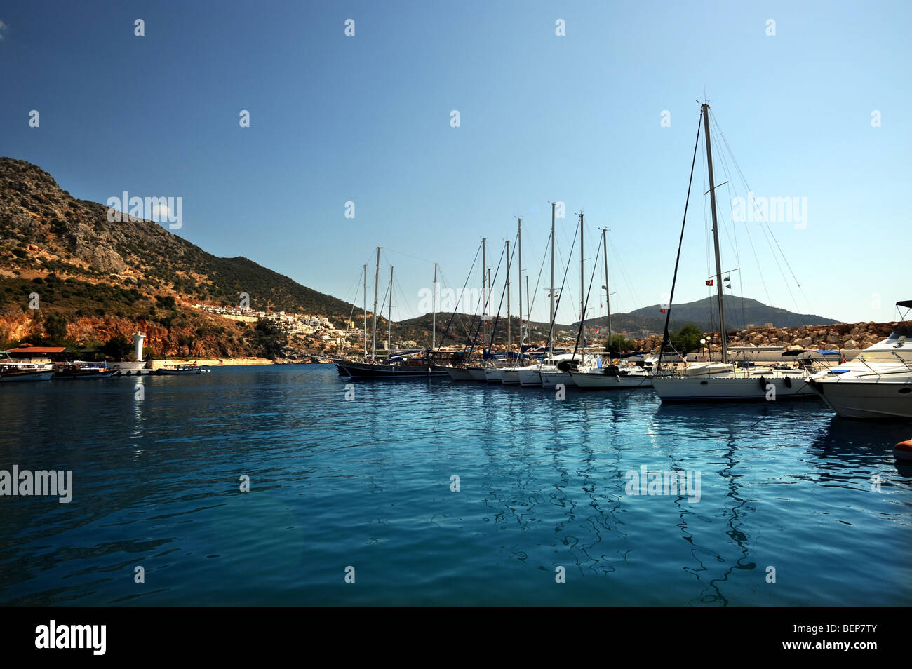 Blue skies and sea in the bay of Kalkan Stock Photo - Alamy