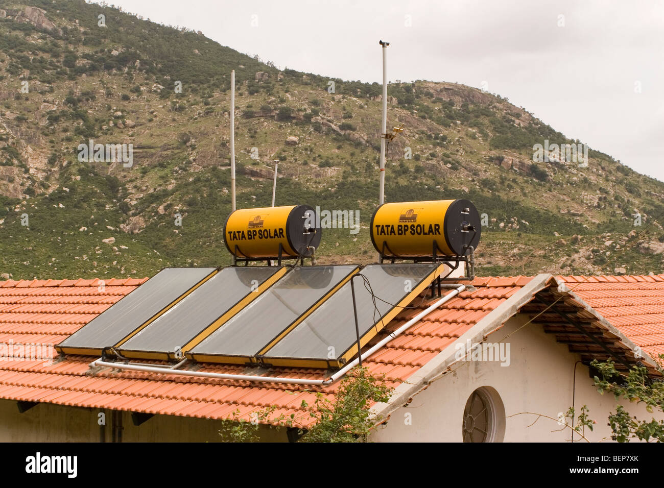 Solar panels sit on the roof of a house in south India, to make energy ...