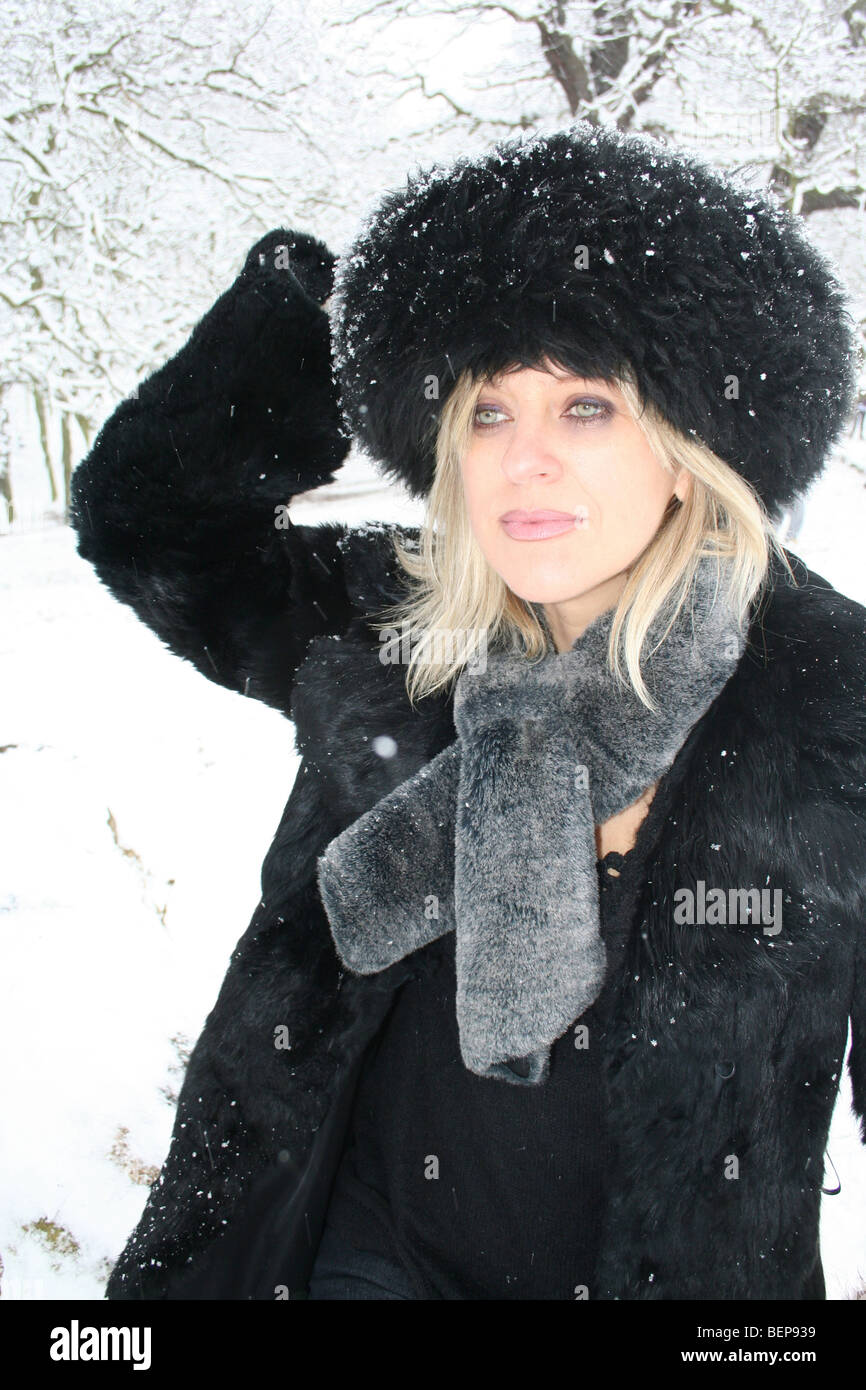 beautiful woman in snow Stock Photo - Alamy