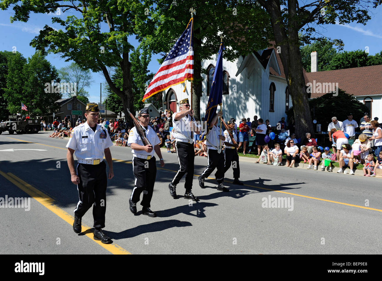 Uniformed Veterans Marching in Parade Honor Guard with Flags Stock ...