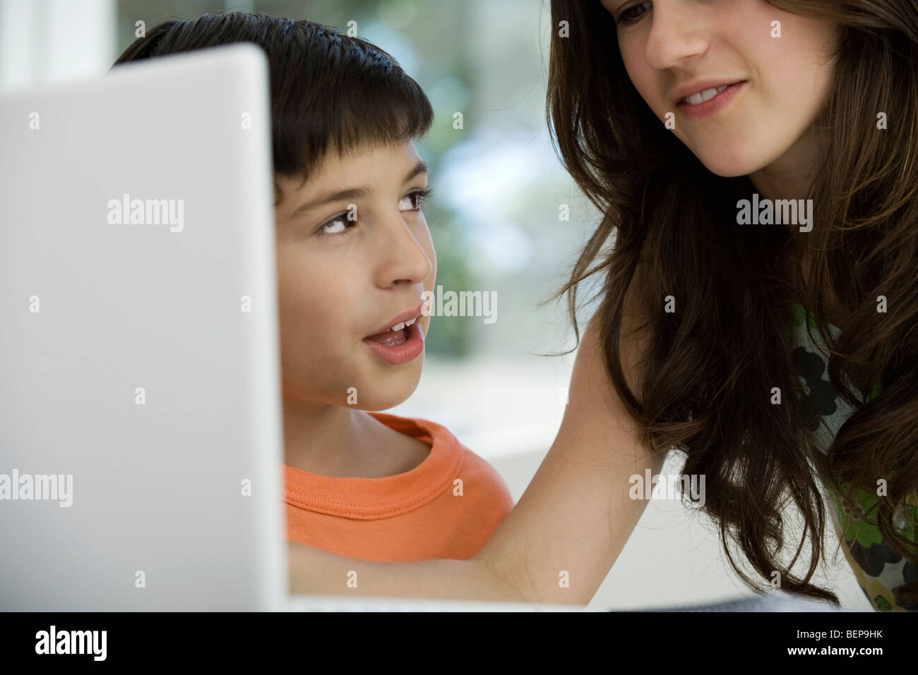 Sister talking to older brother hi-res stock photography and images - Alamy