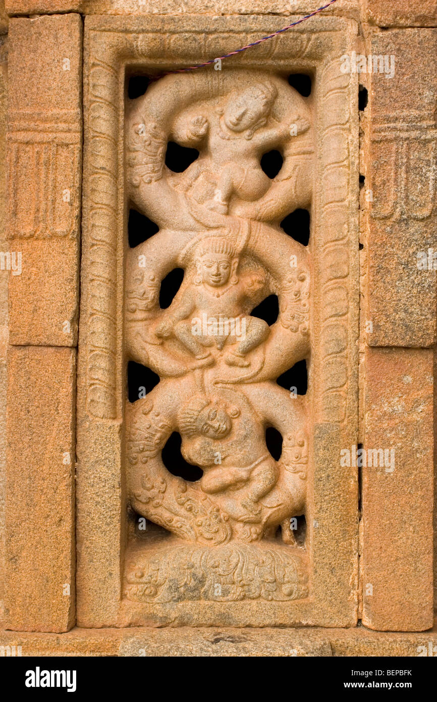 Sculpted figures showing people decorate a Hindu temple in Karnataka ...
