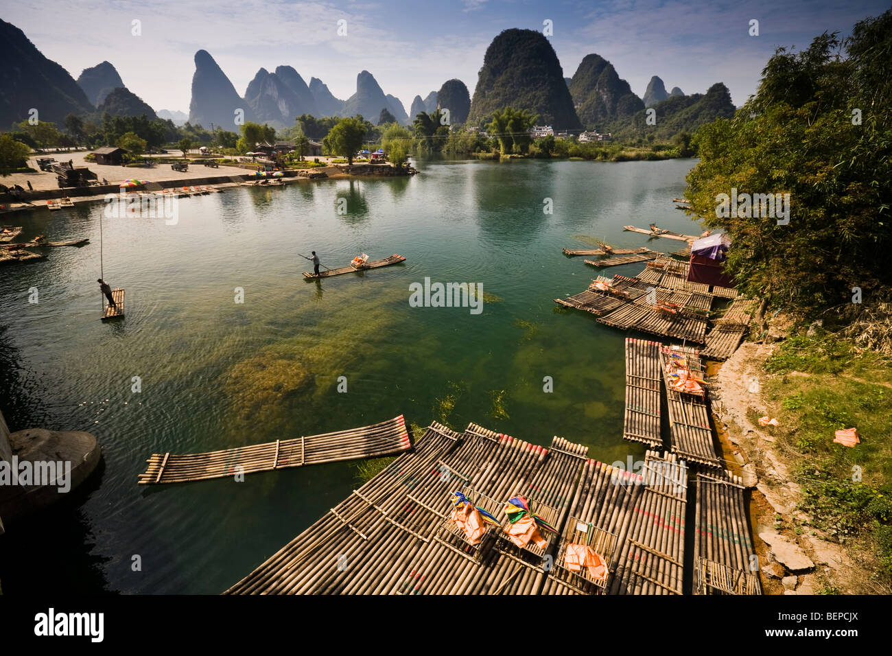 Bamboo rafts floating with cargo on the Li River amidst the karst ...