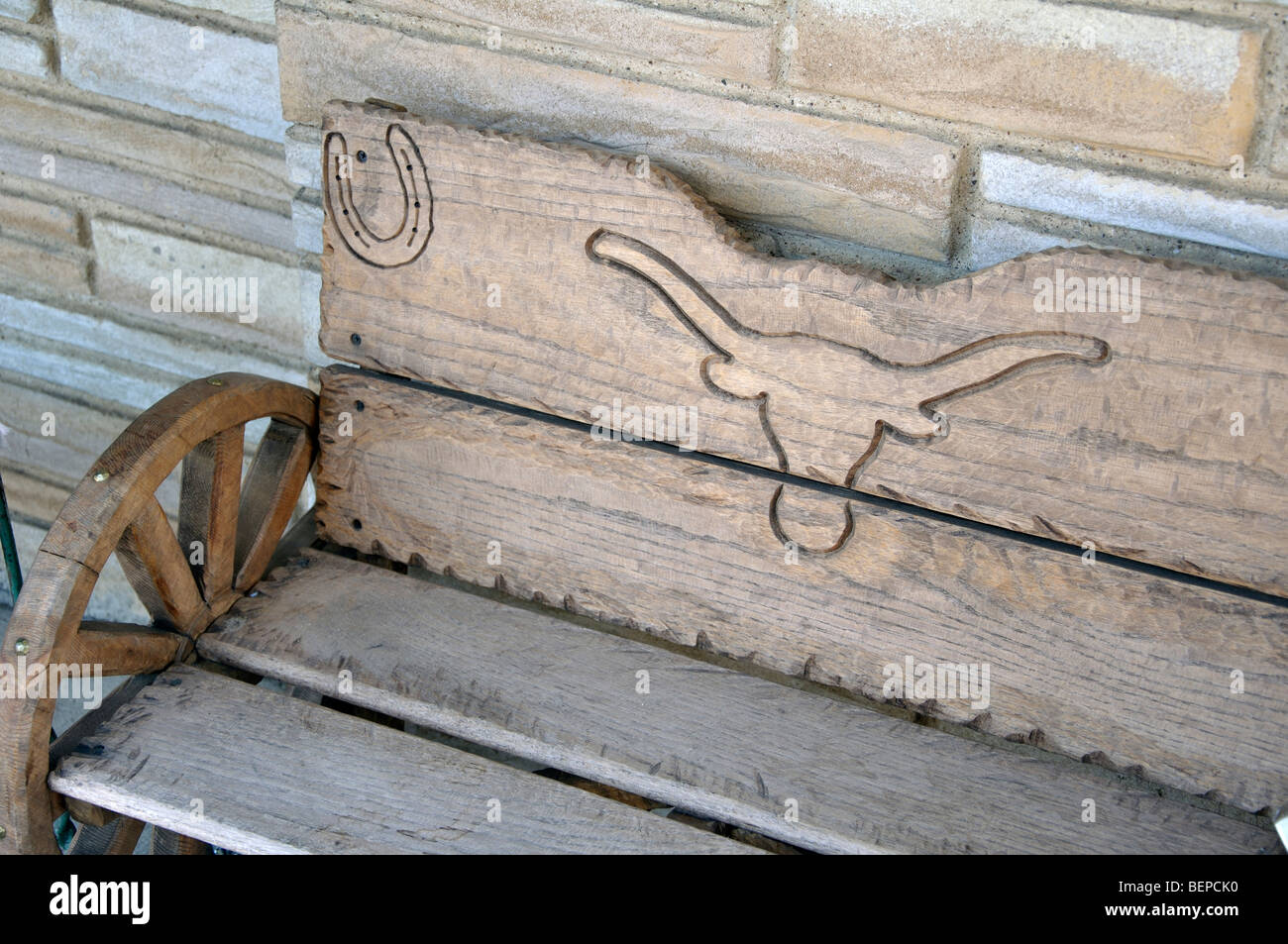 Longhorn sign on antique bench, Texas Stock Photo - Alamy