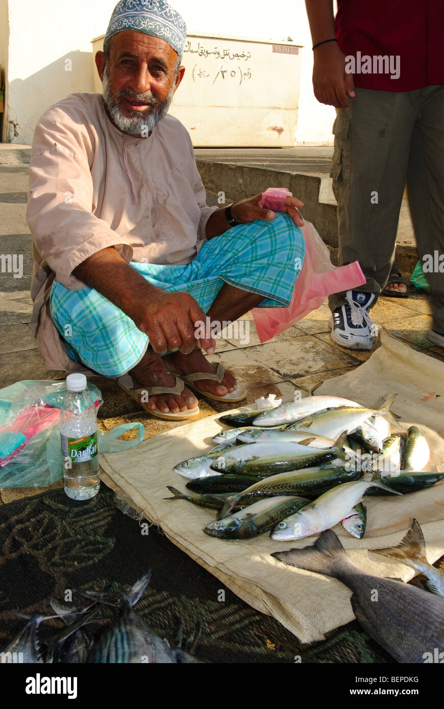 Old man at the fish market, Muscat, Oman Stock Photo - Alamy