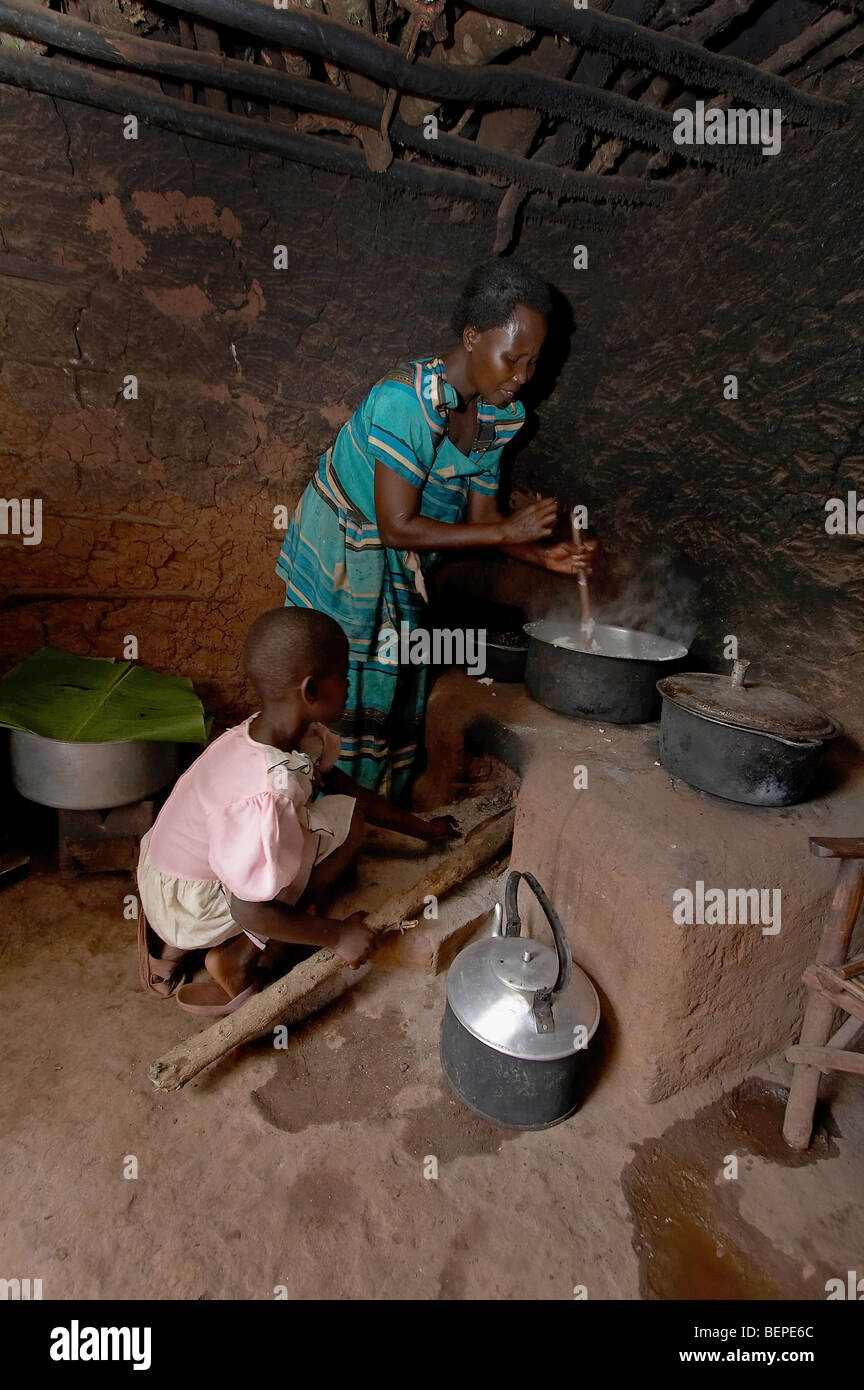 UGANDA A fuel-efficient wood burning cooking stove being used, Kayunga ...