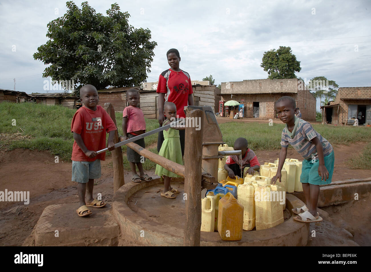 UGANDA Hand pumped bore hole in use, Village of Kabembe, Mukono ...
