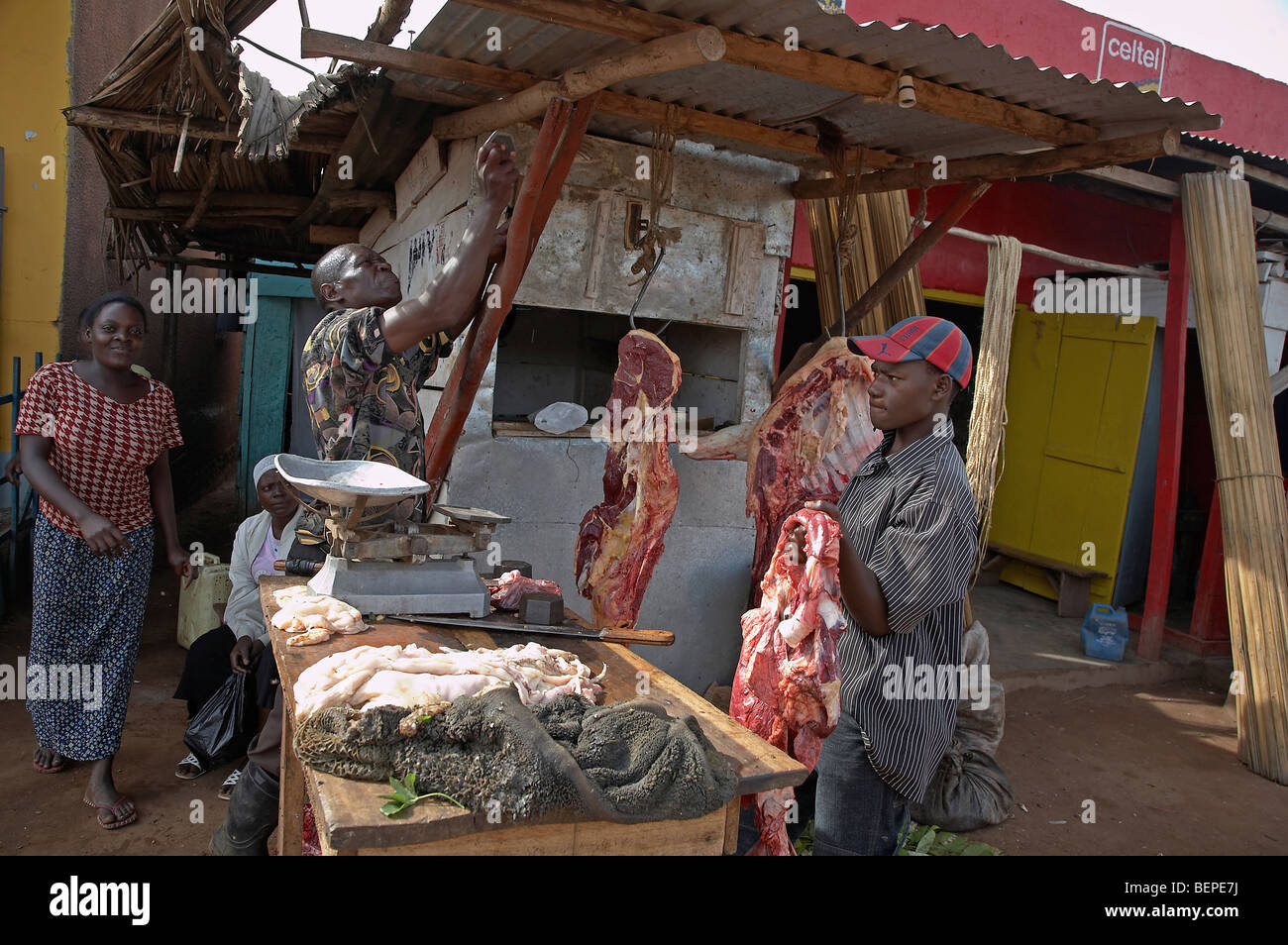 UGANDA Butchers stall at the street market in Karagi village, Mukono ...