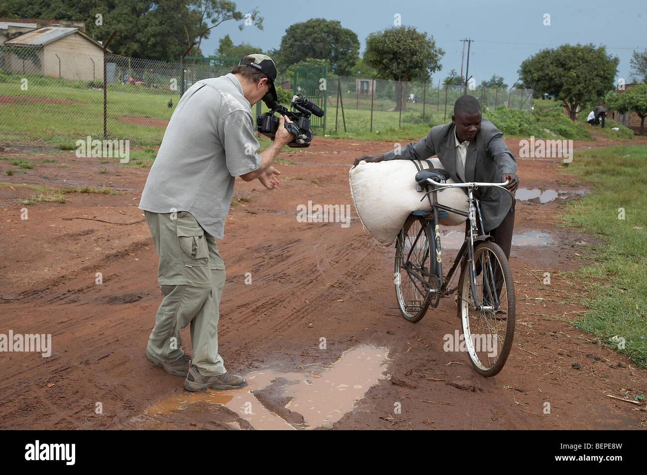 UGANDA Bringing maize to the community mill. Village of Kayunga ...