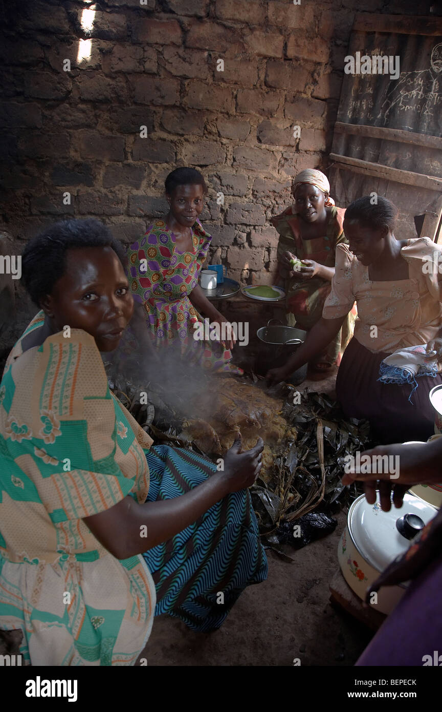 UGANDA Women making 'matoke', the traditional steamed banana staple ...