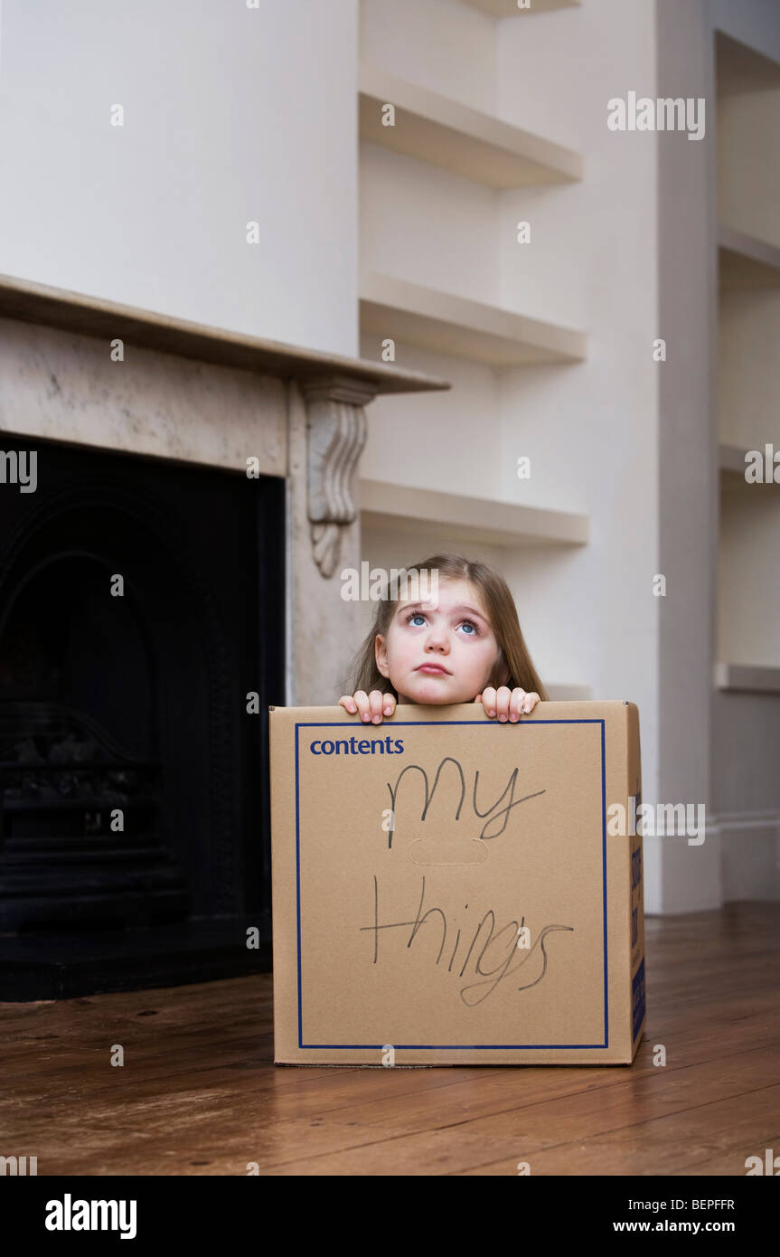 Child sitting in Box Stock Photo - Alamy