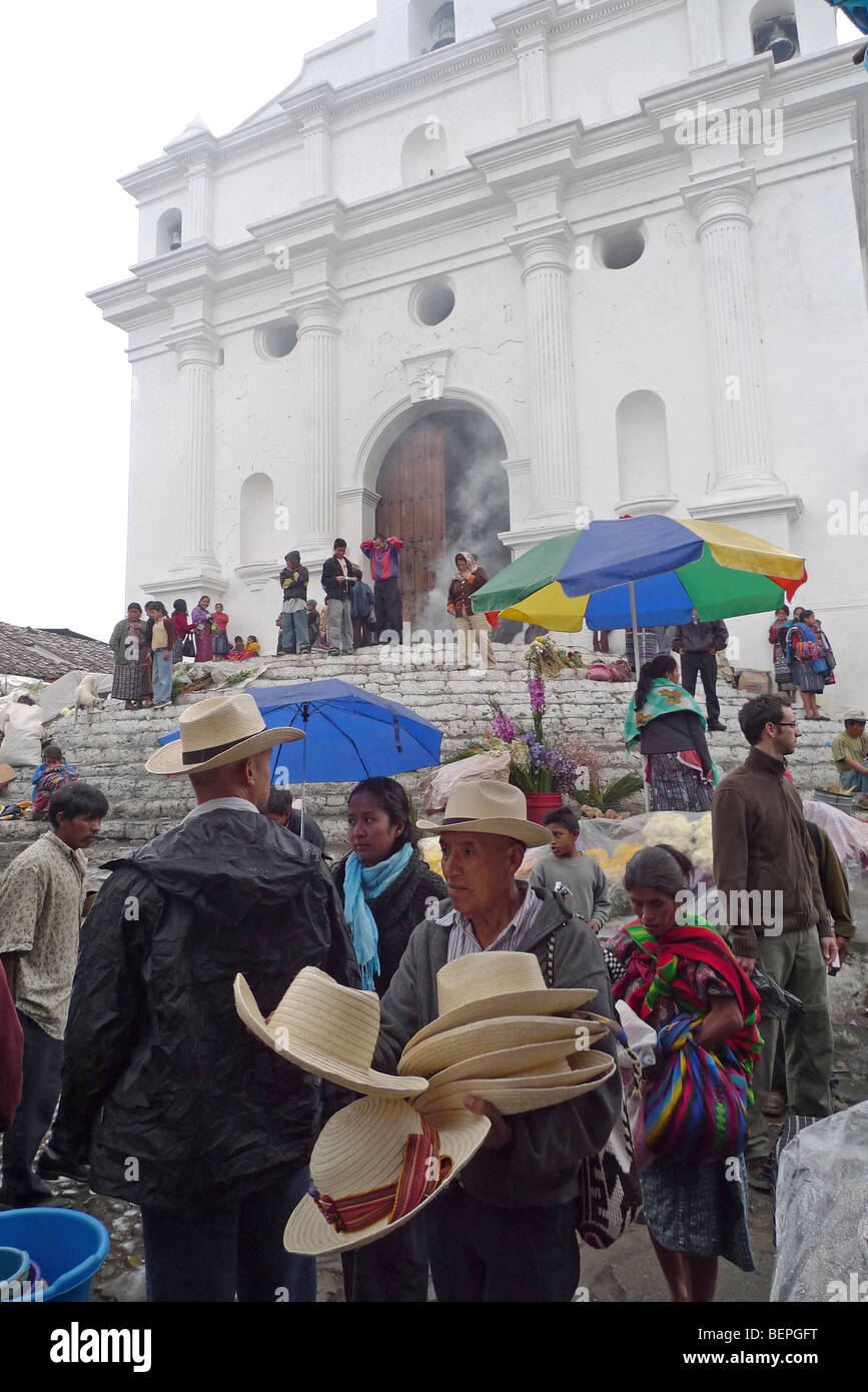 GUATEMALA Chichicastenango market on the steps of Catholic church. Hat ...