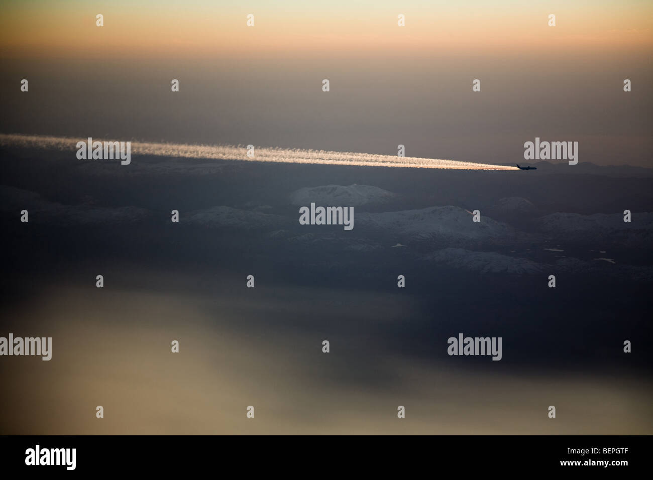 Airplane wing against a dramatic sunset dusk sky Stock Photo - Alamy