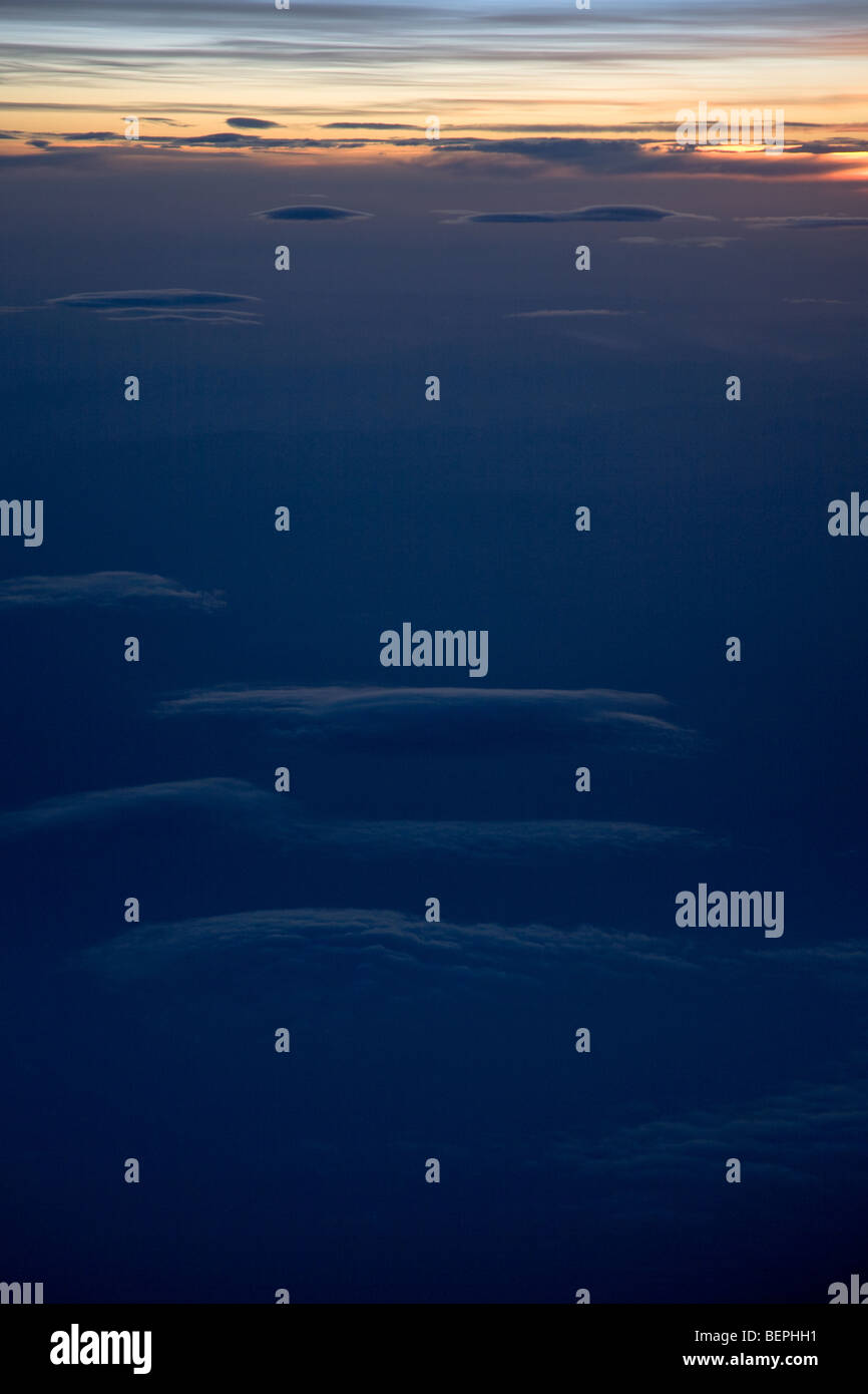 cloud formation dusk sunset wispy sky skies sun Stock Photo - Alamy